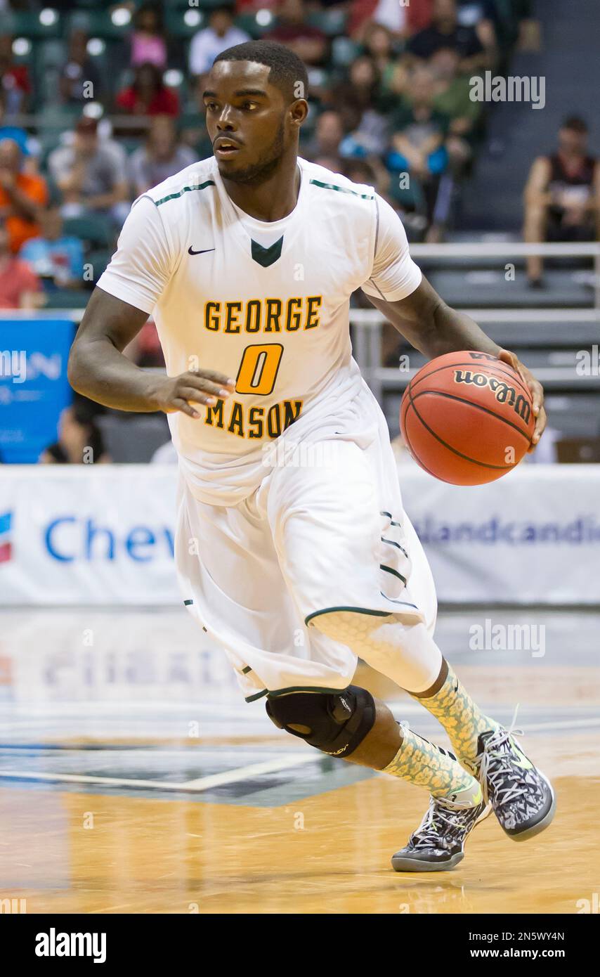 George Mason guard Bryon Allen (0) dribbles the basketball in the ...