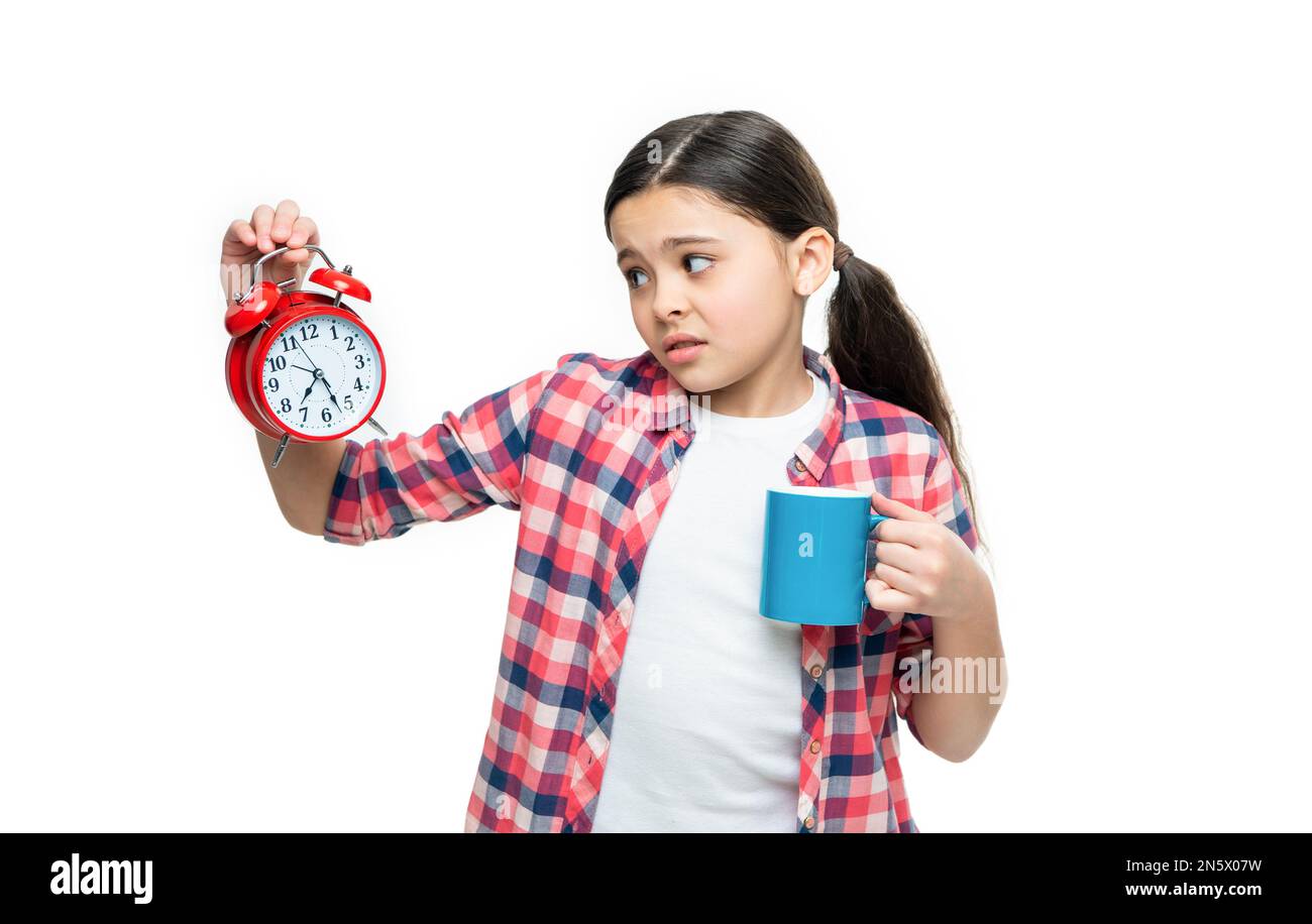 confused girl with morning coffee and alarm on background. photo of ...