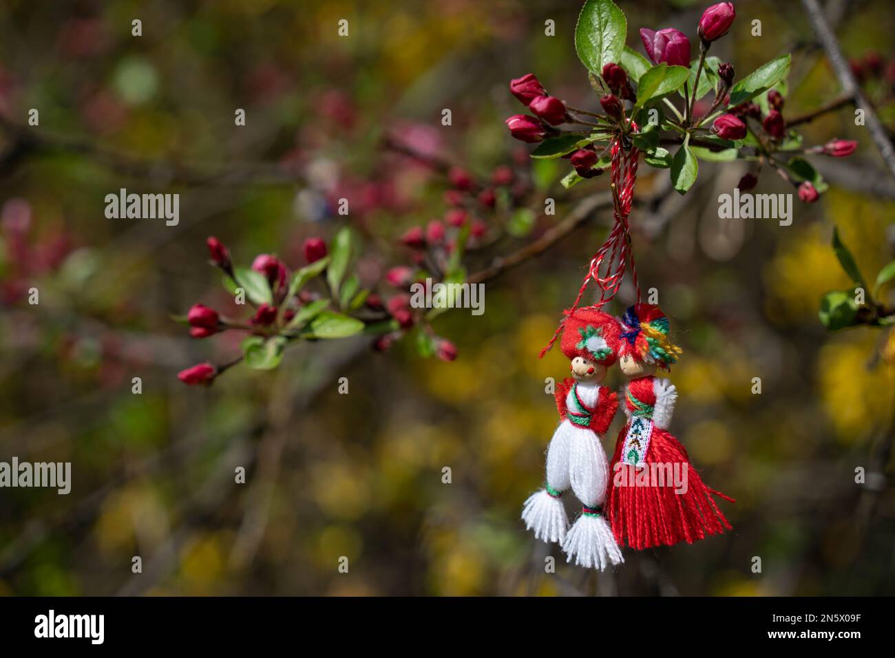 Greeting card background for the arrival of spring. Red-white man and ...