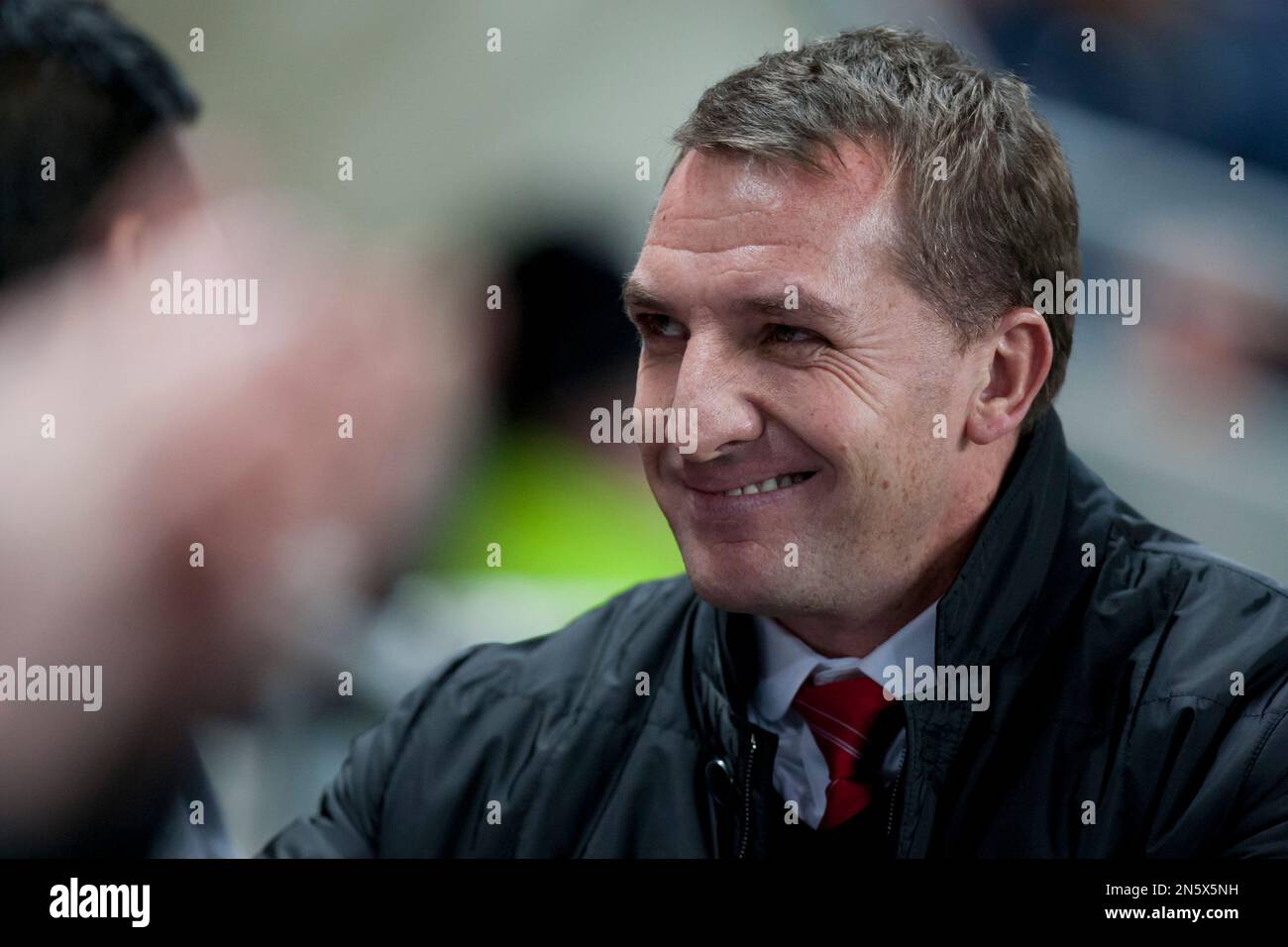 Liverpool's manager Brendan Rodgers smiles as he takes to the touchline ...