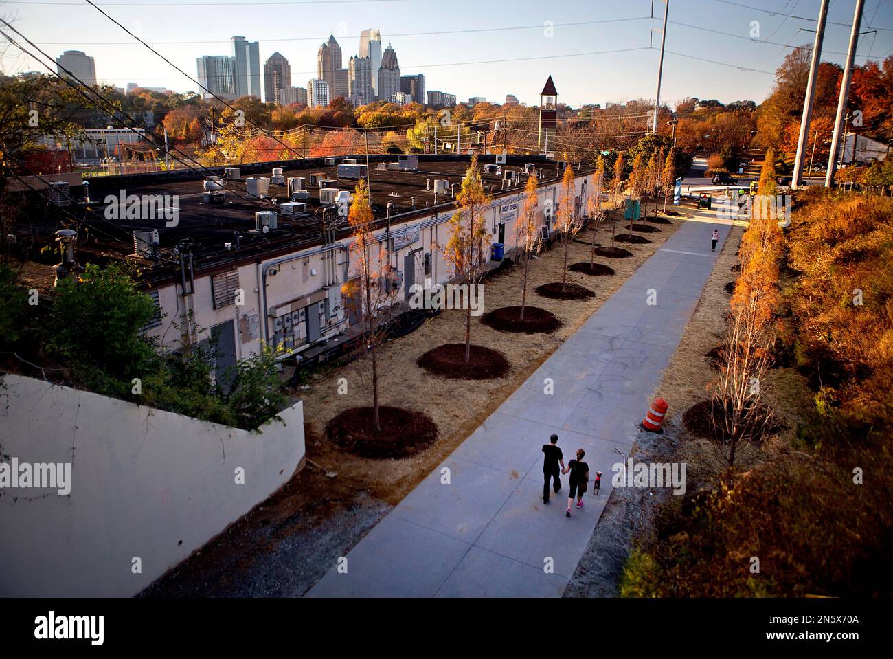 FILE- In this Nov. 20, 2012 file photo, a couple walks along the ...