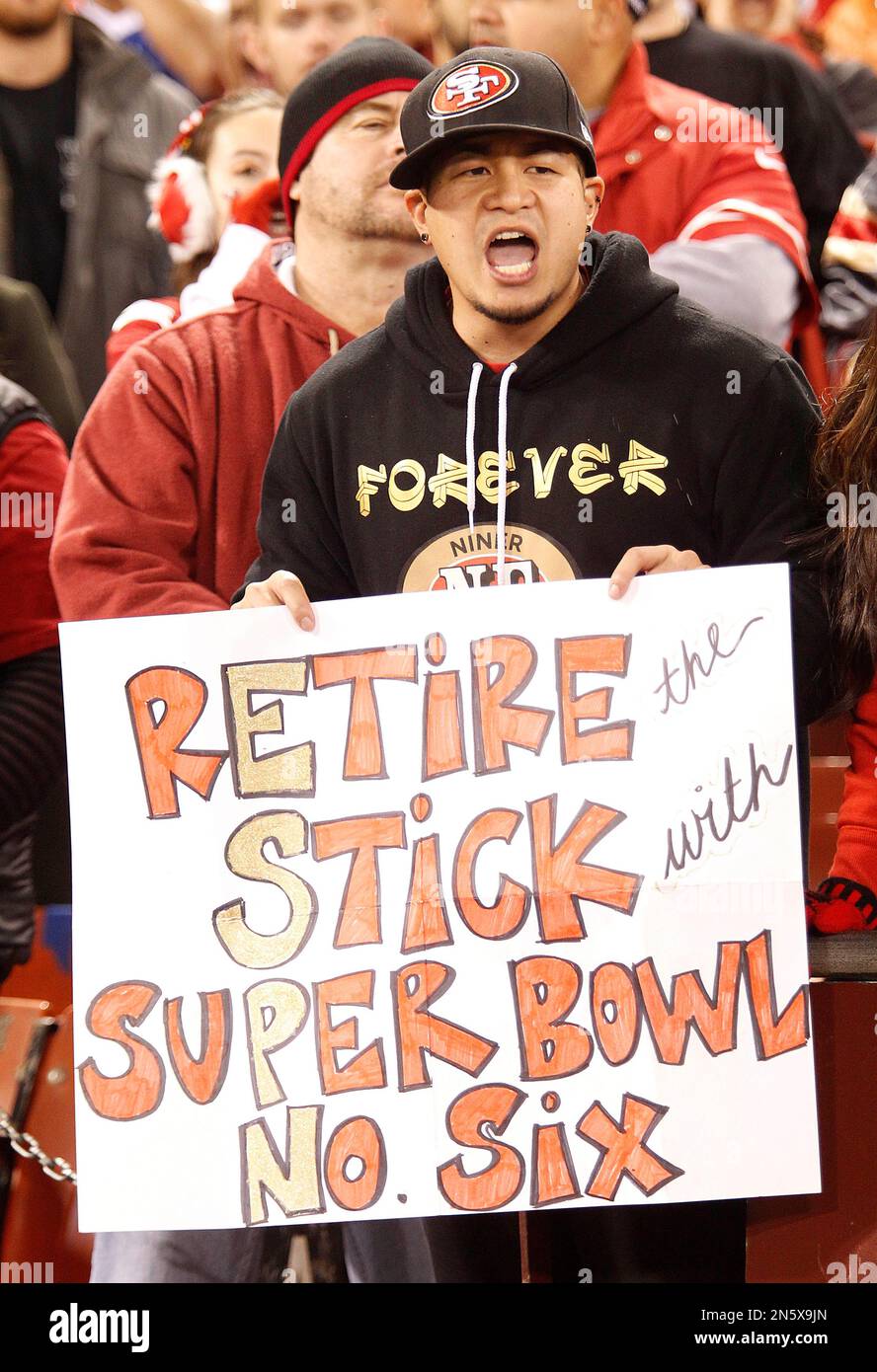San Francisco 49ers fan Ryan Sakamoto holds up a sign for Candlestick ...