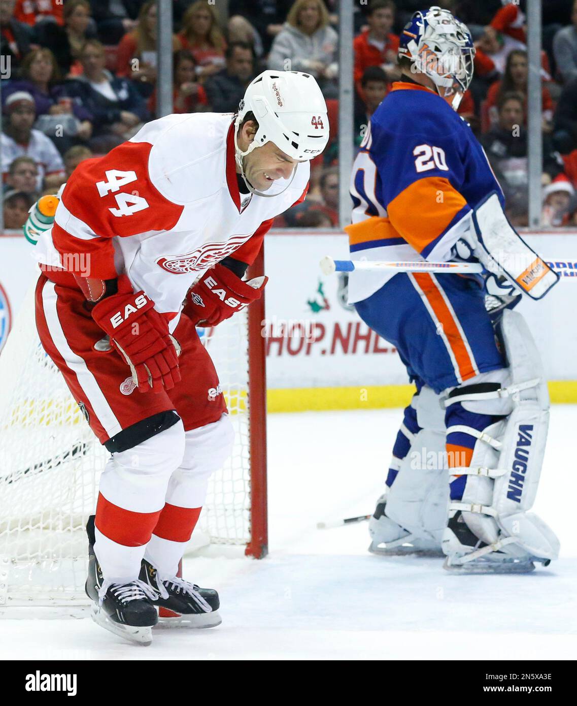 Detroit Red Wings right wing Todd Bertuzzi (44) grimaces in pain while leaving the ice against ...