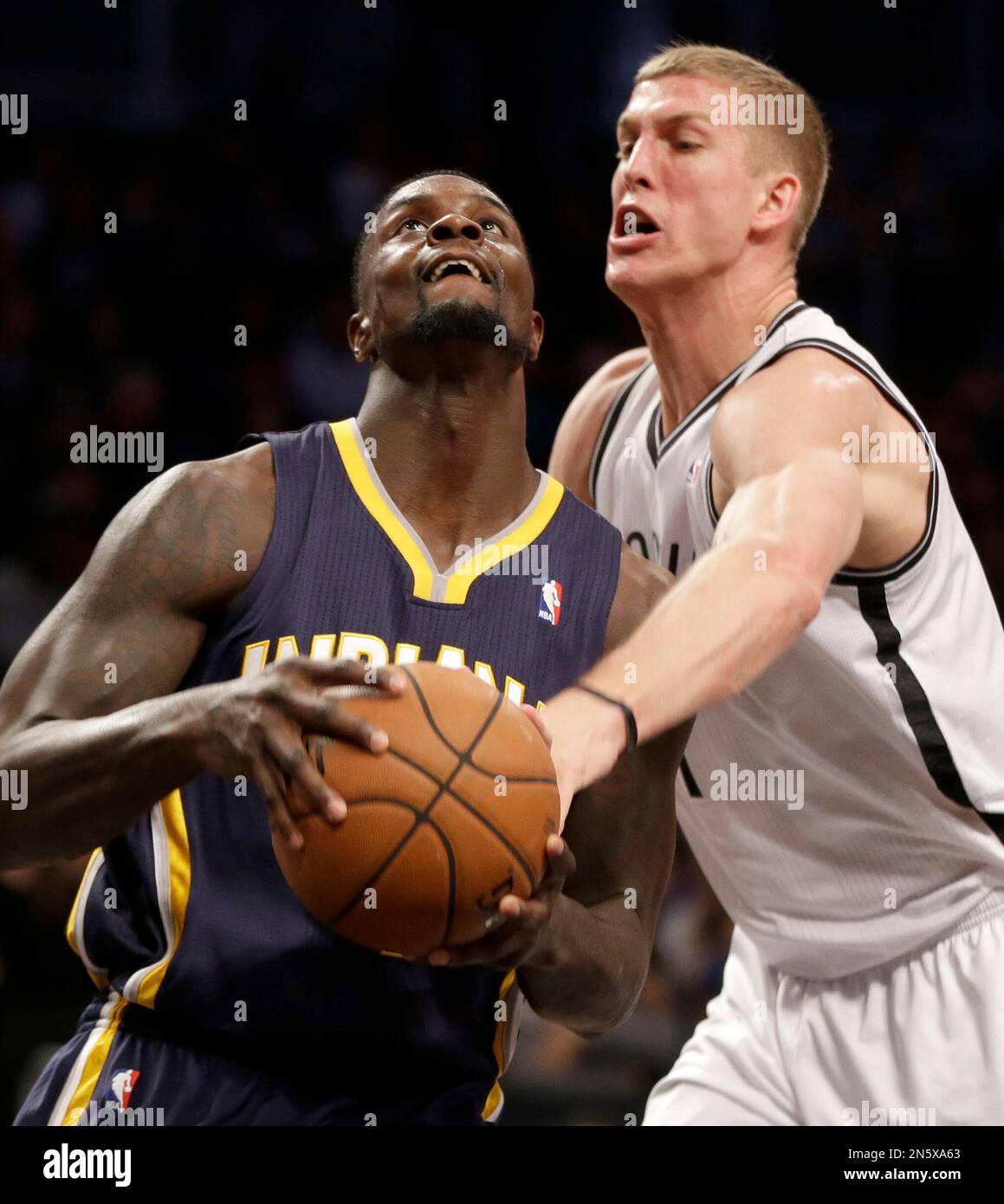 Brooklyn Nets' Mason Plumlee, right, fouls Indiana Pacers' Lance ...