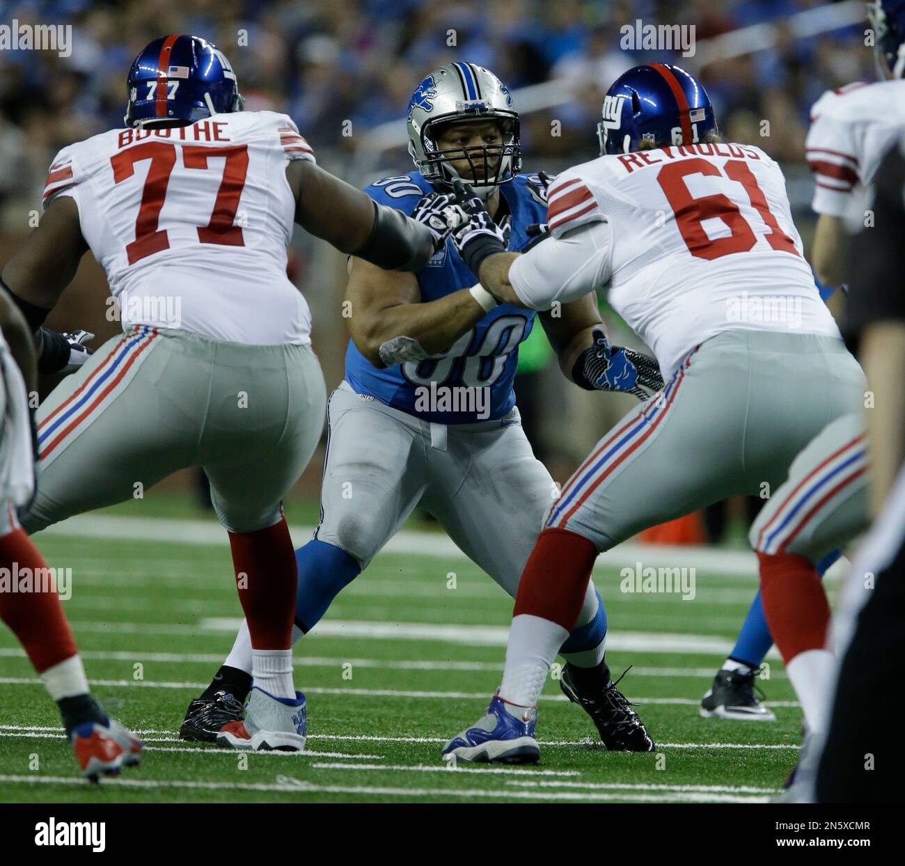 Detroit Lions defensive tackle Ndamukong Suh (90) goes up against New ...