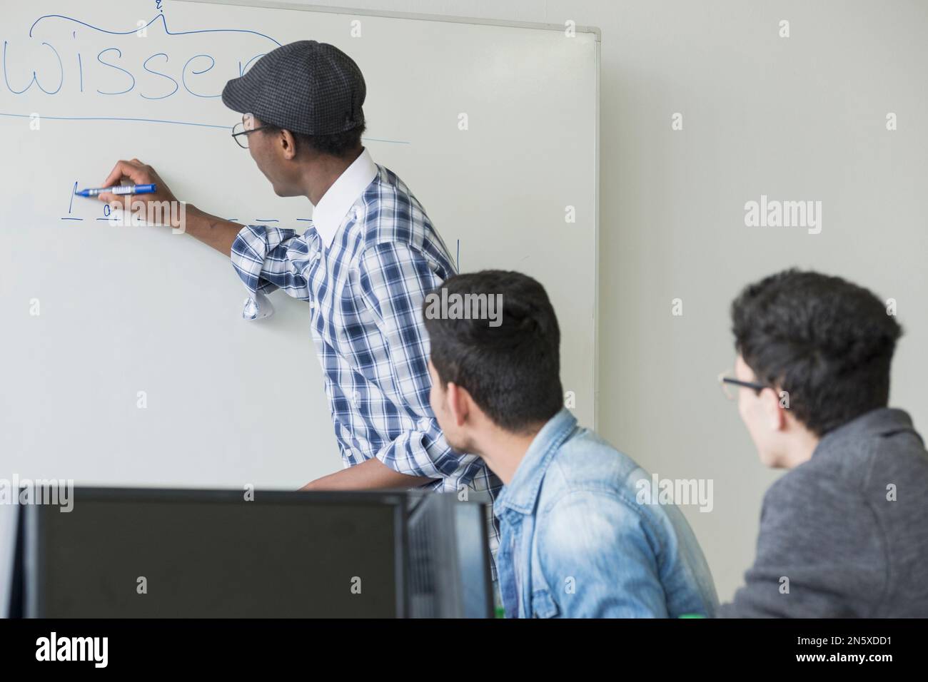 University student explaining on board School, Bavaria, Germany Stock ...