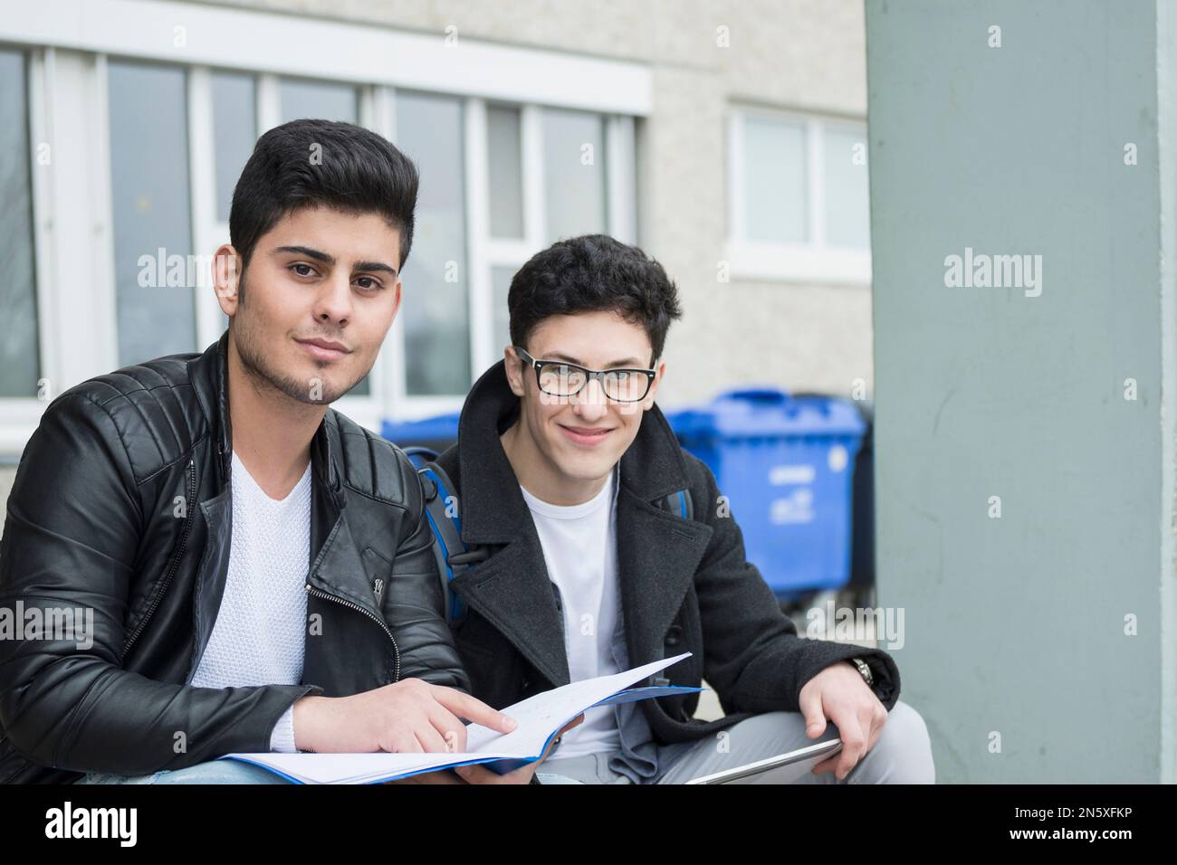 University students reading book in campus School, Bavaria, Germany ...