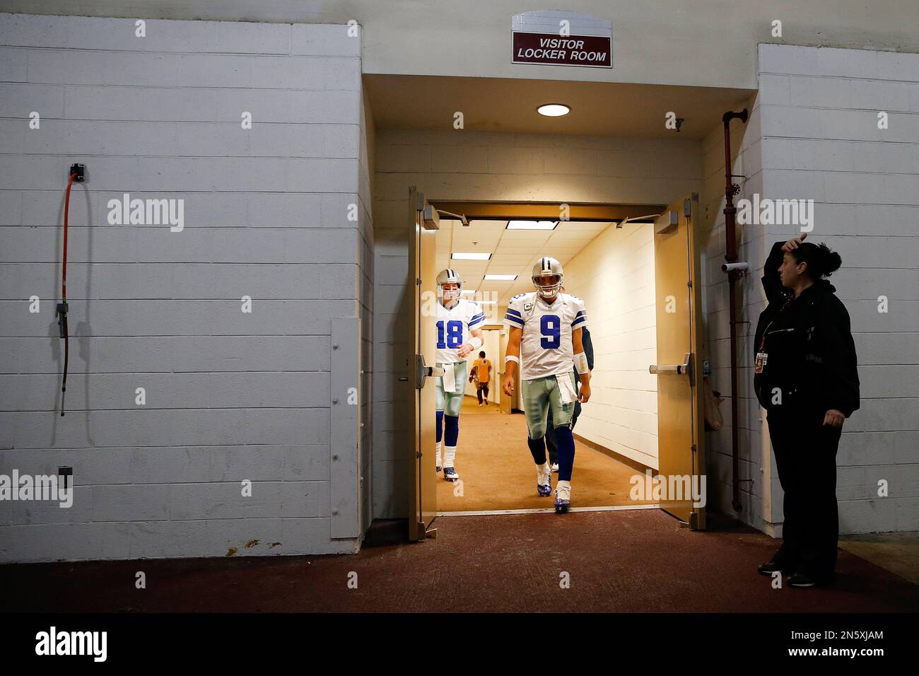 Dallas Cowboys quarterback Tony Romo (9) and quarterback Kyle Orton (18 ...