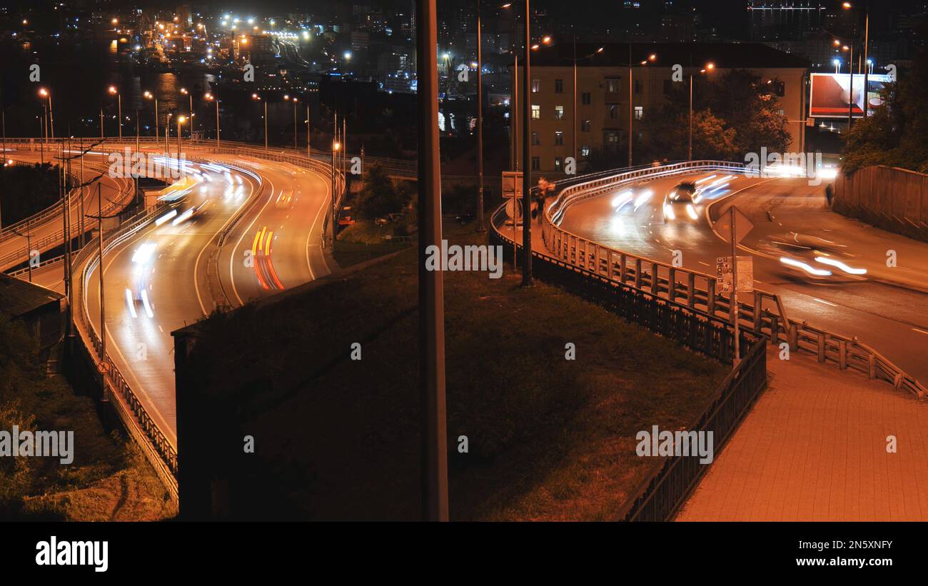Car traffic at night in city Vladivostok Stock Photo - Alamy