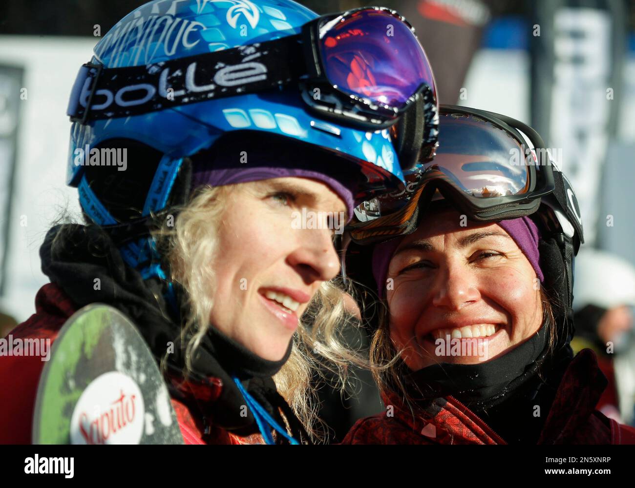 Canada's Maelle Ricker, right, and Dominique Maltais talk to reporters ...