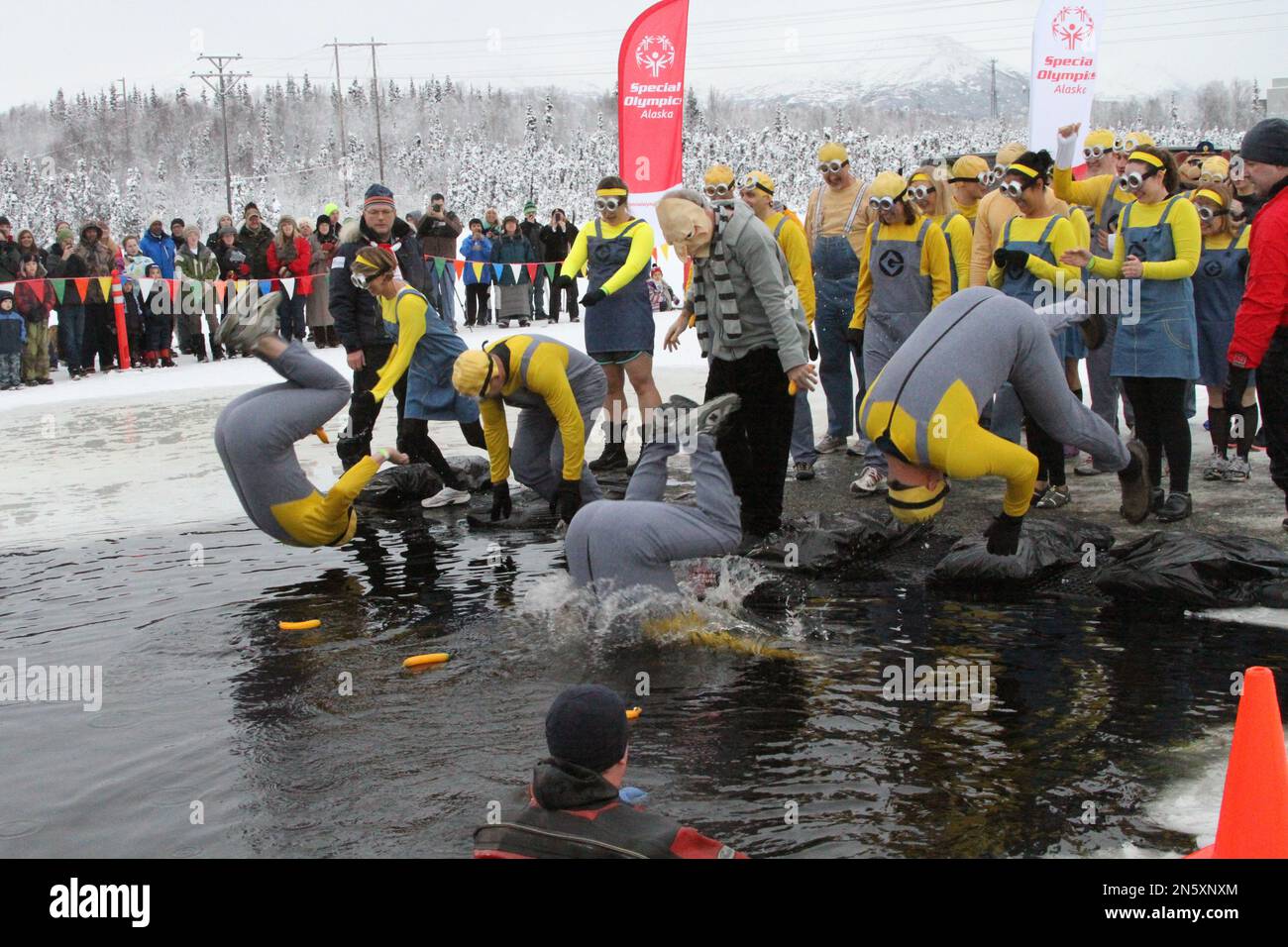Participants, dressed as minions from the "Despicable Me" animated film ...