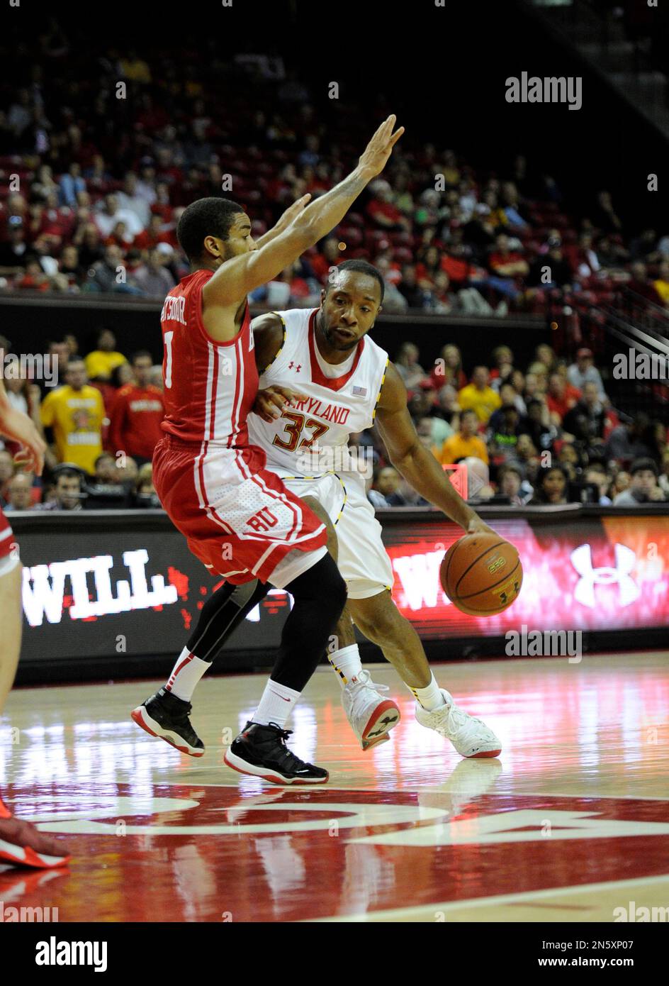 Maryland guard/forward Dez Wells (32) dribbles against Boston ...