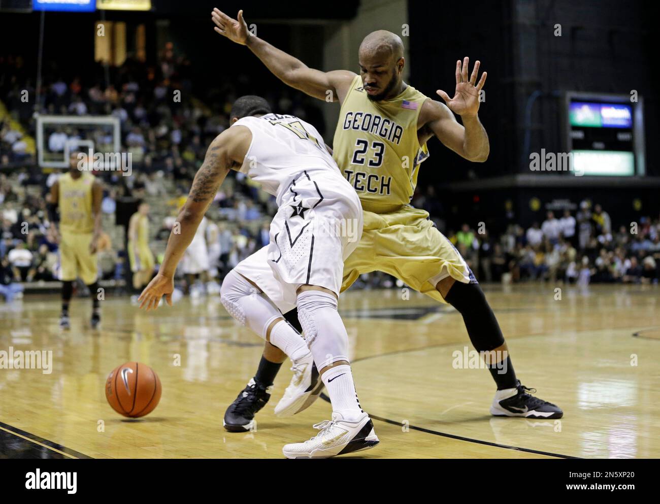 Georgia Tech guard Trae Golden (23) tries to block the path of ...