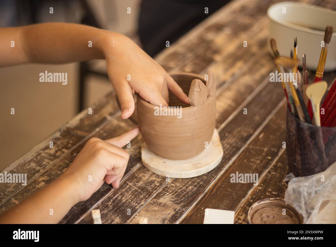 Child clay modeling class hi-res stock photography and images - Alamy