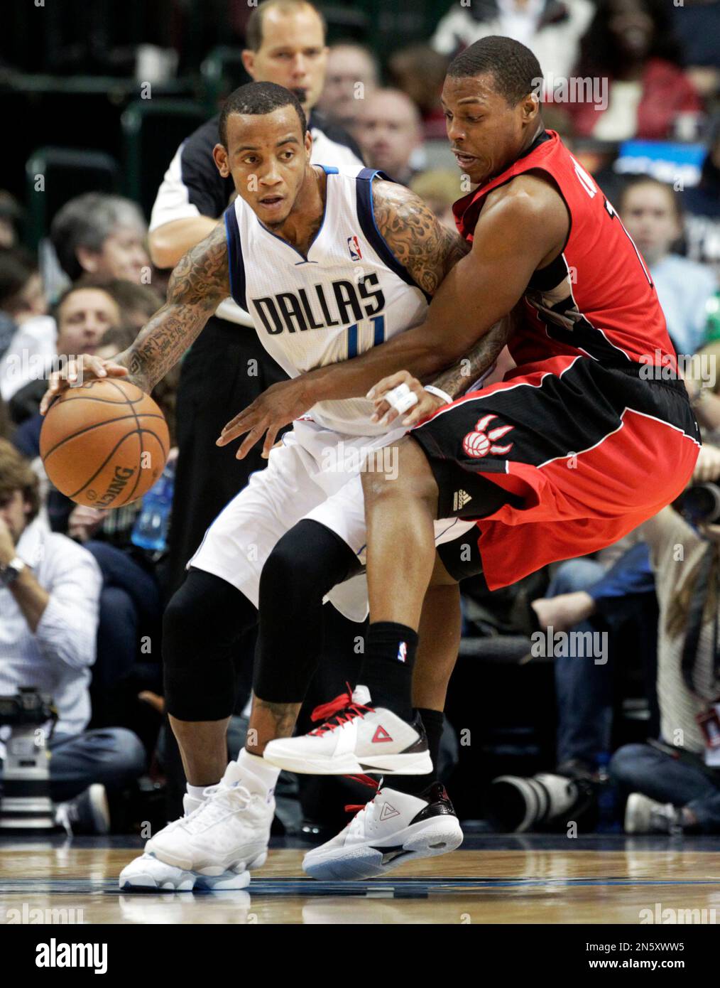 Dallas Mavericks' Monta Ellis (11) fights for position against Toronto ...