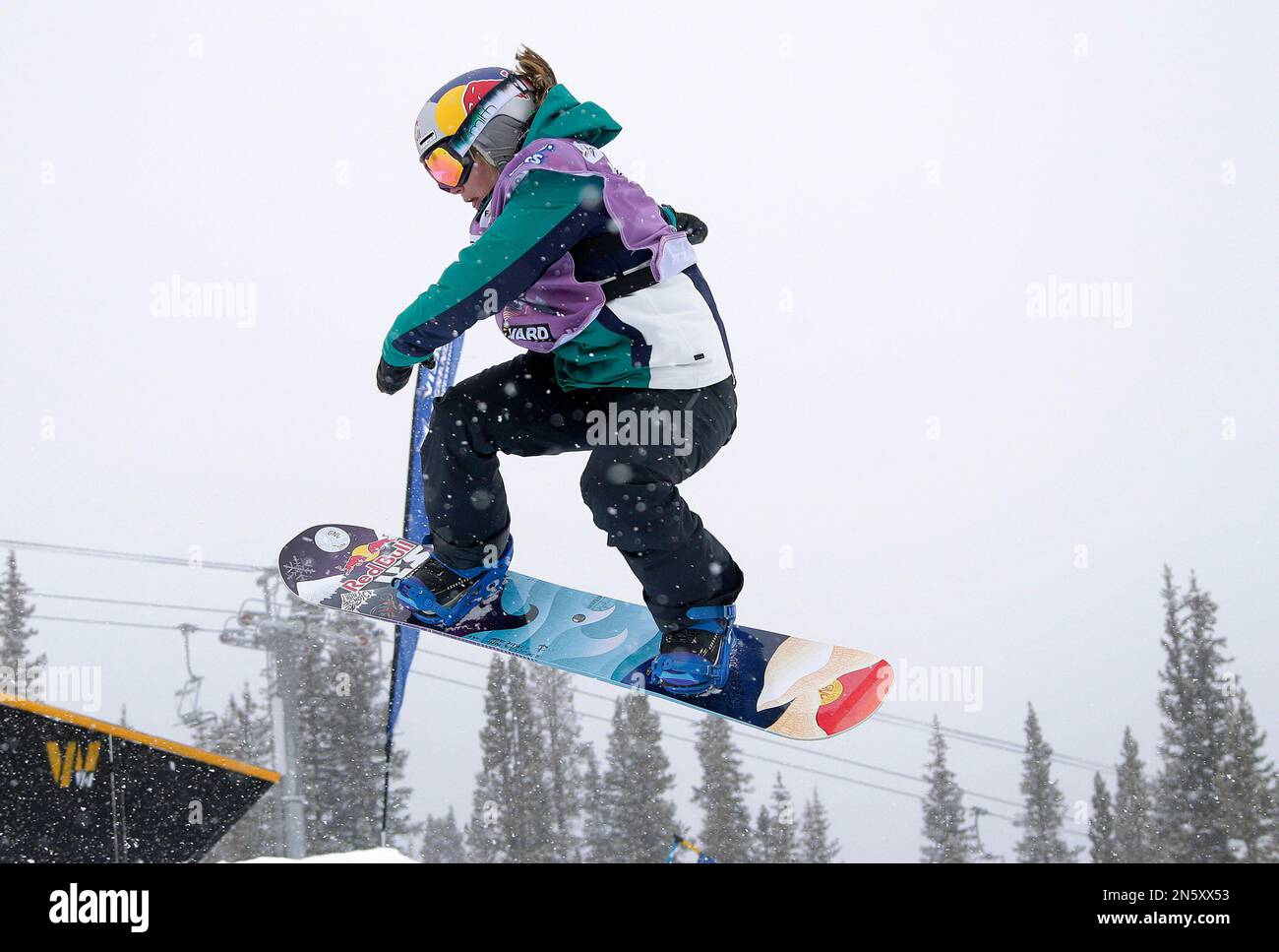 Ty Walker, of the United States, slides off a rail during the World Cup ...