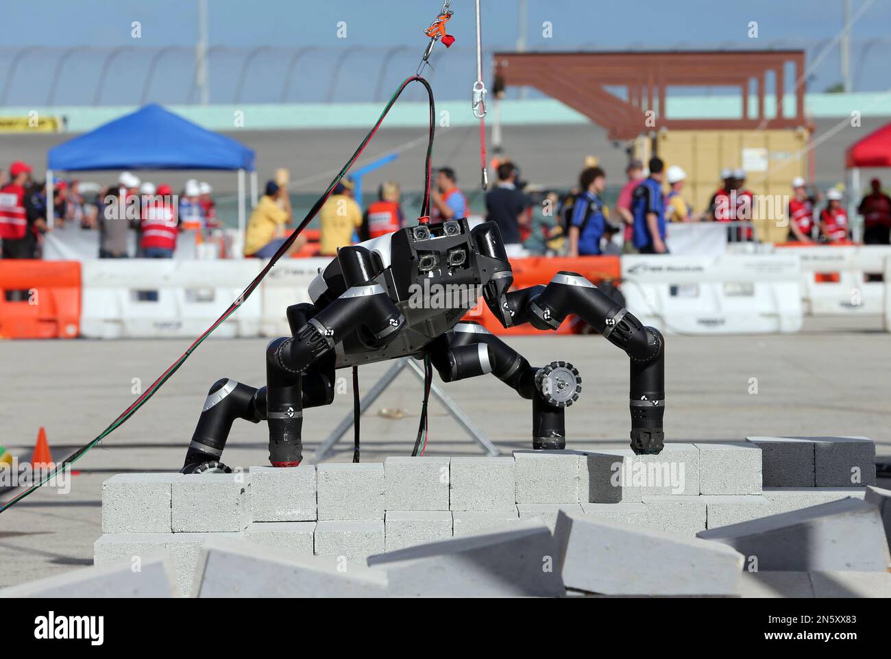 RoboSimian, NASA Jet Propulsion Laboratory, takes a step during the ...