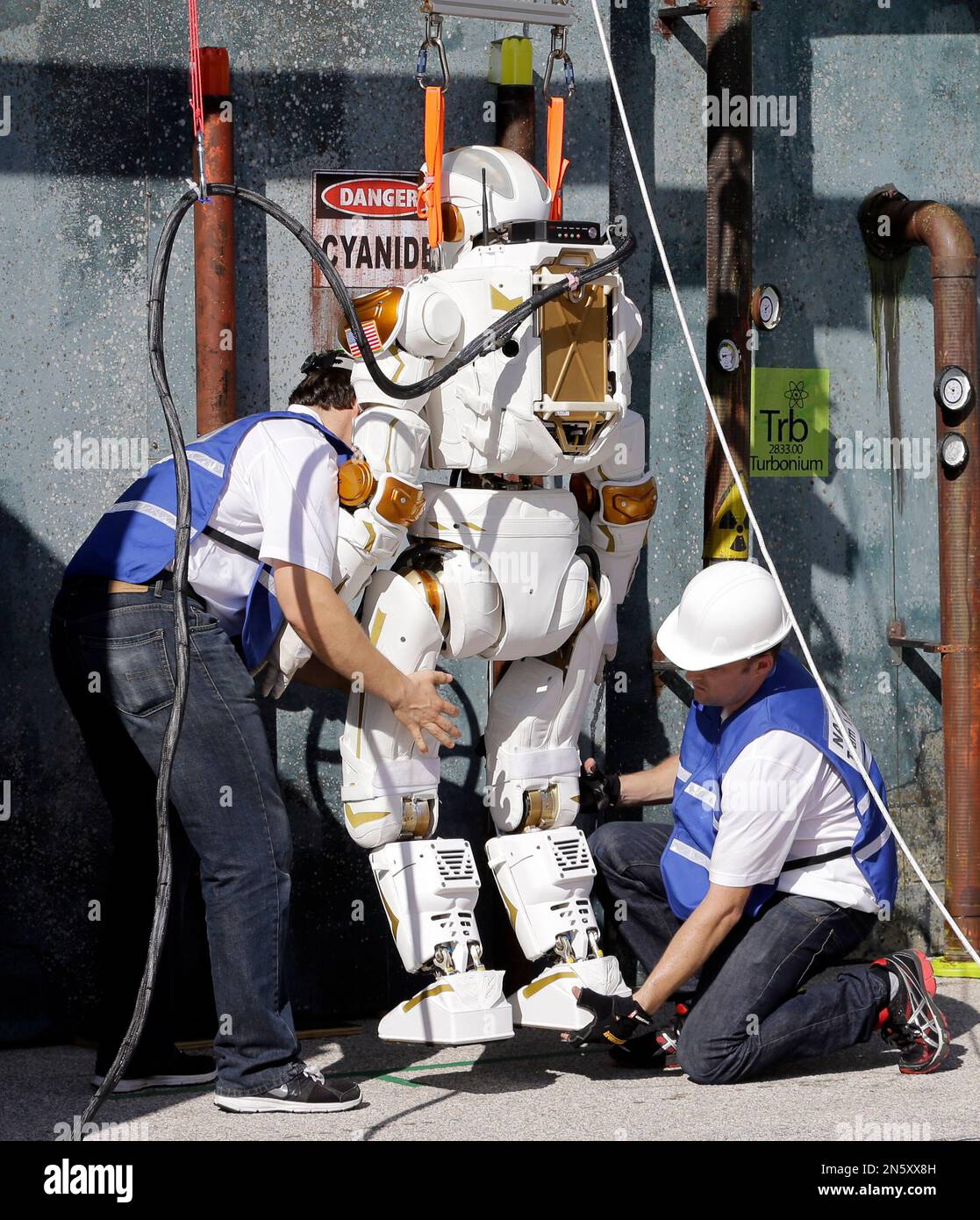 Members of Team Valkyrie, NASA Johnson Space Center, try to repair ...