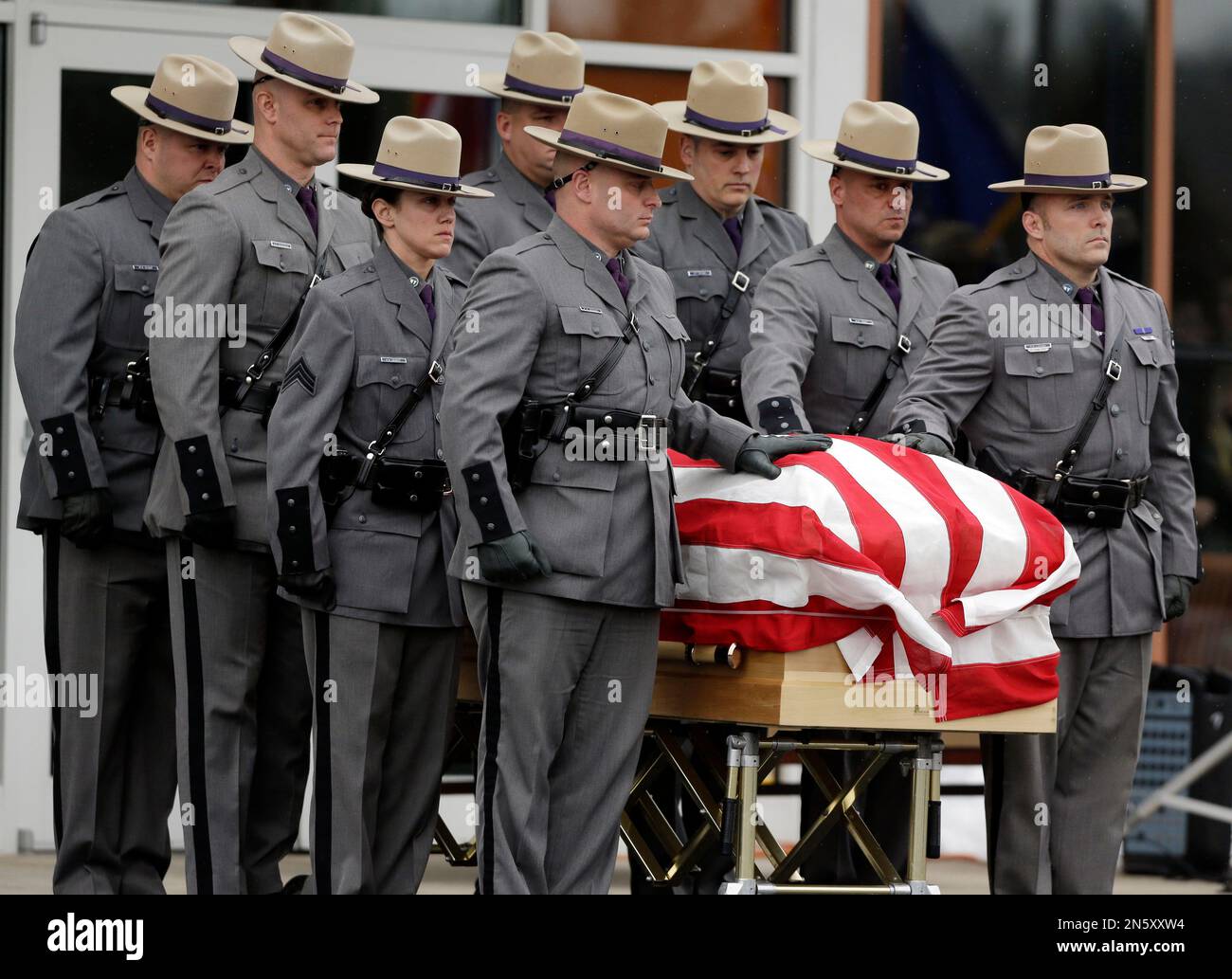 The casket of New York State Trooper David Cunniff is taken from Grace ...