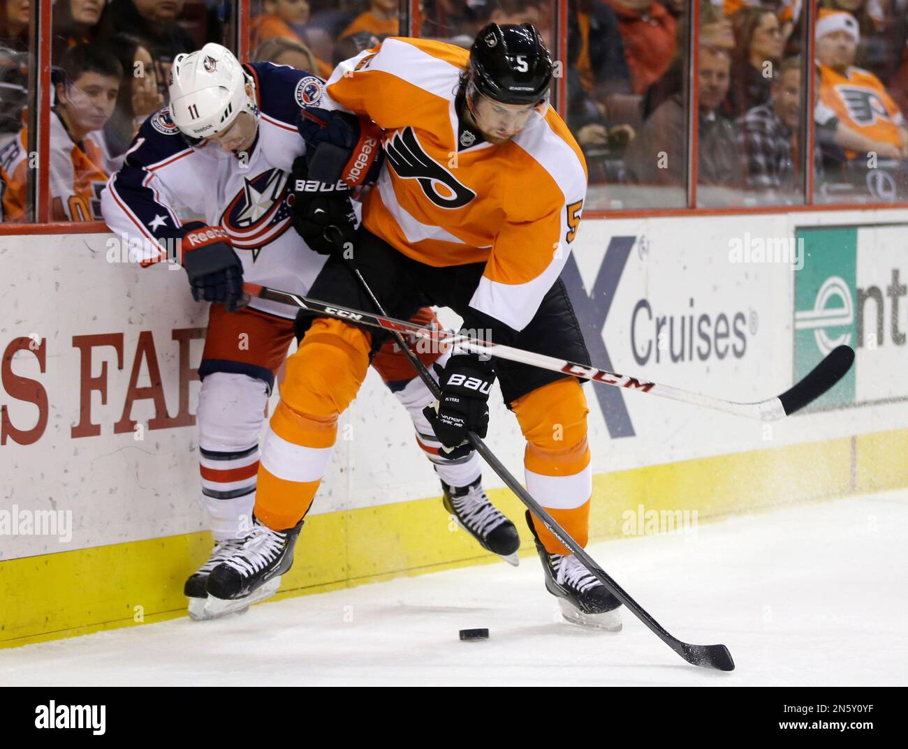 Philadelphia Flyers' Braydon Coburn, right, and Columbus Blue Jackets ...