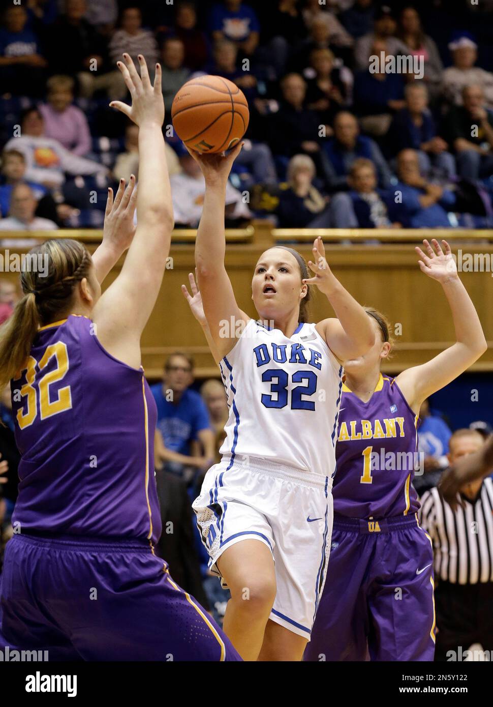 Duke's Tricia Liston (32) shoots as Albany's Megan Craig (32) and Erin ...