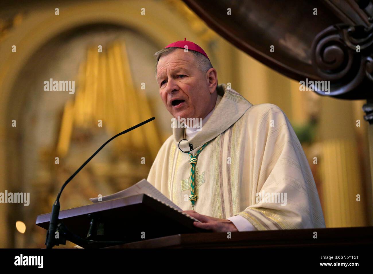 Archbishop Gregory Aymond presides over the funeral Mass for artist ...
