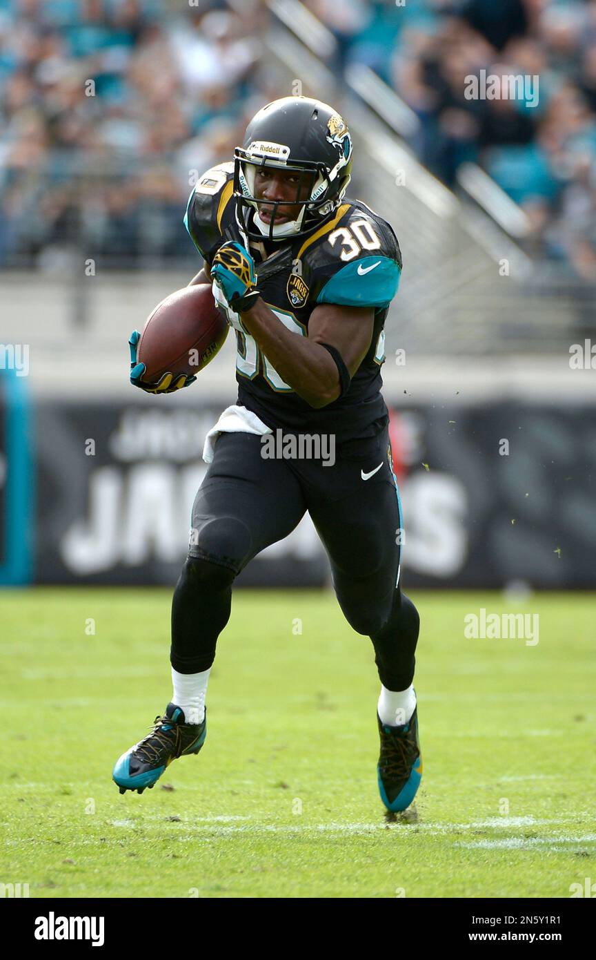 Jacksonville Jaguars running back Jordan Todman (30) runs for yardage ...