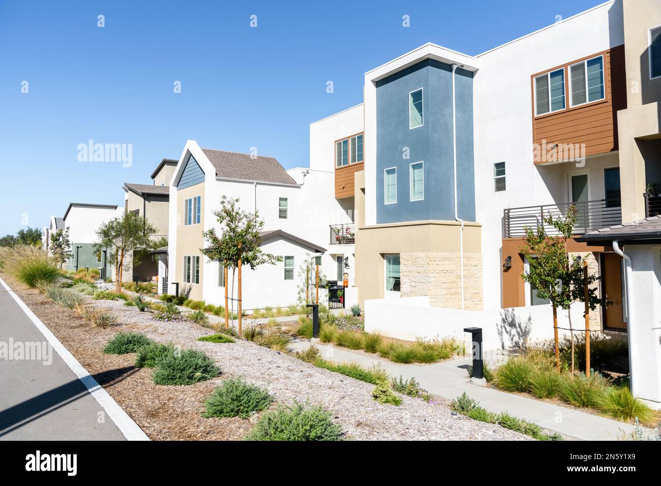 New modern terraced houses in a housing development in California on a ...