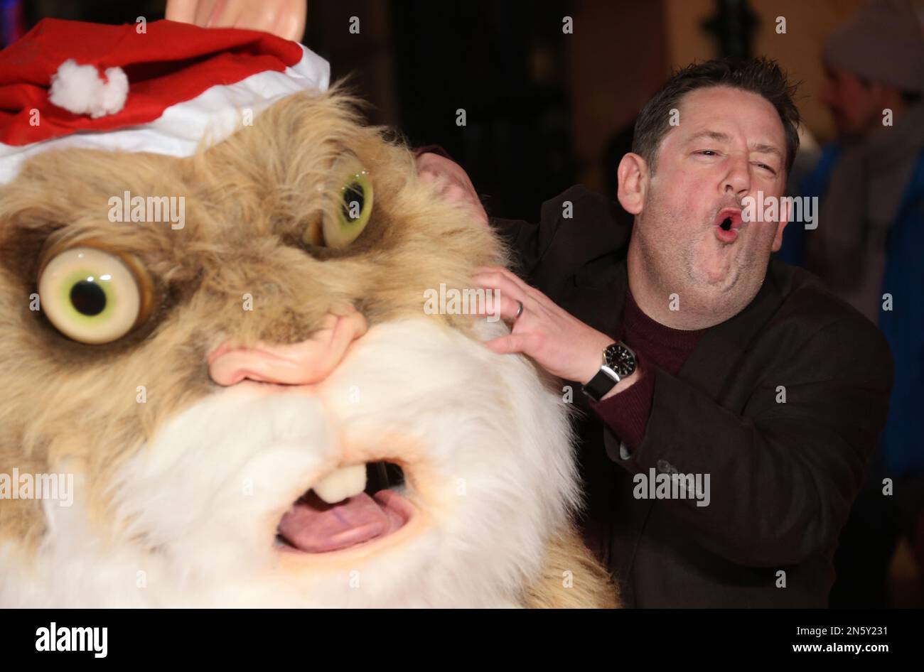 British comedian Johnny Vegas poses for photographs with a giant ...