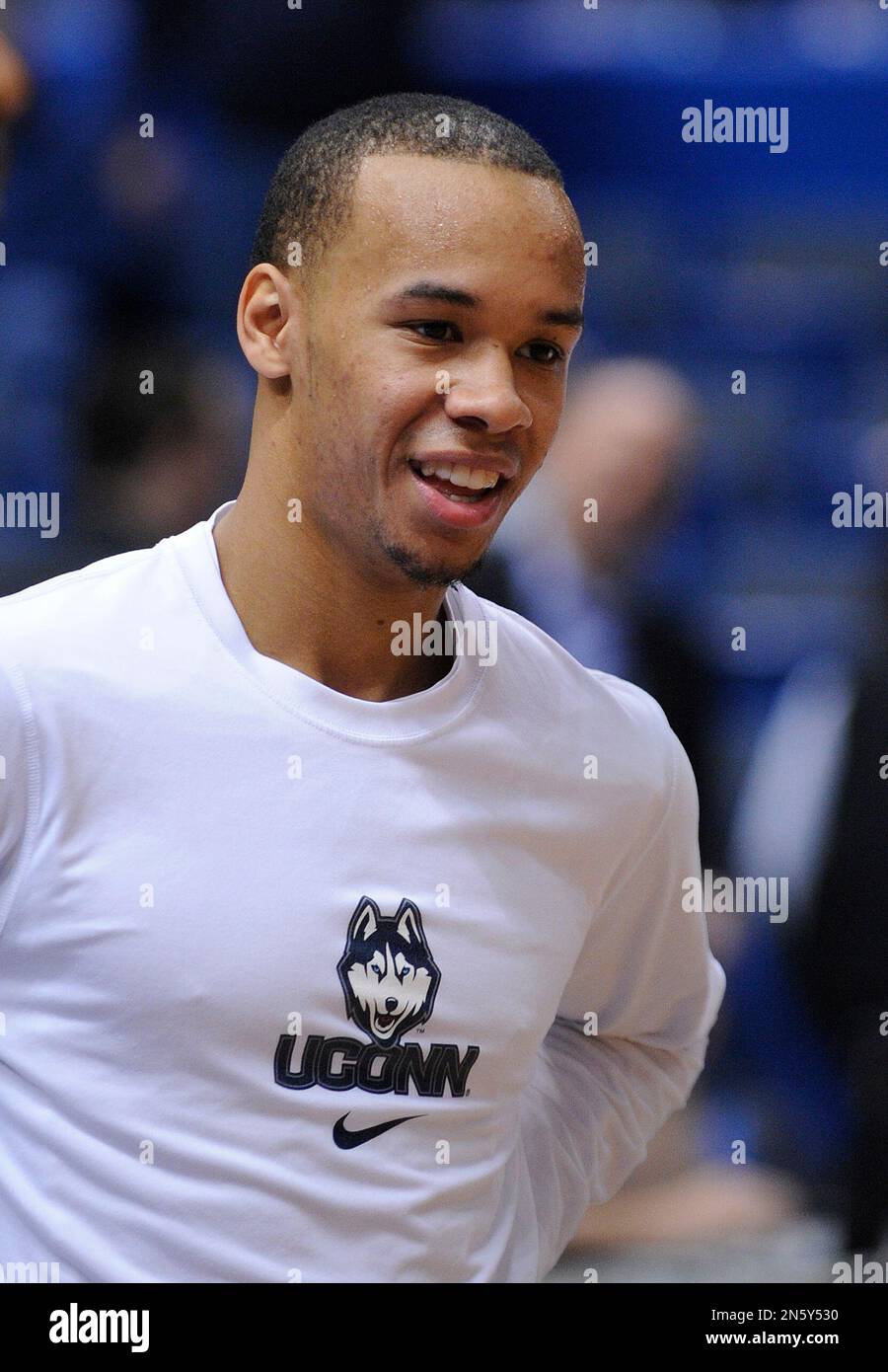 Connecticut's Shabazz Napier (13) warms up before an NCAA college ...