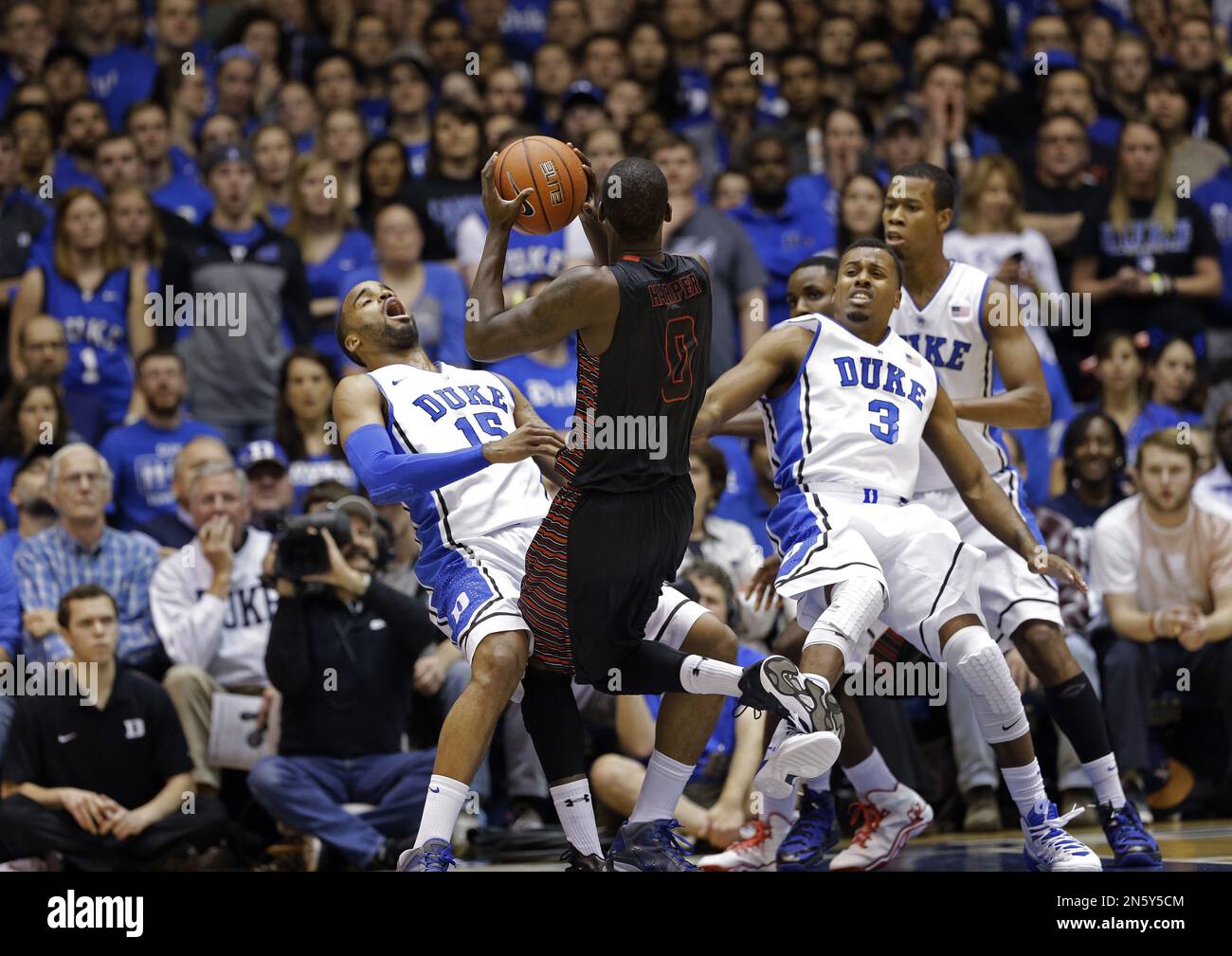 Duke's Josh Hairston (15) and Tyler Thornton (3) guard Gardner-Webb's ...