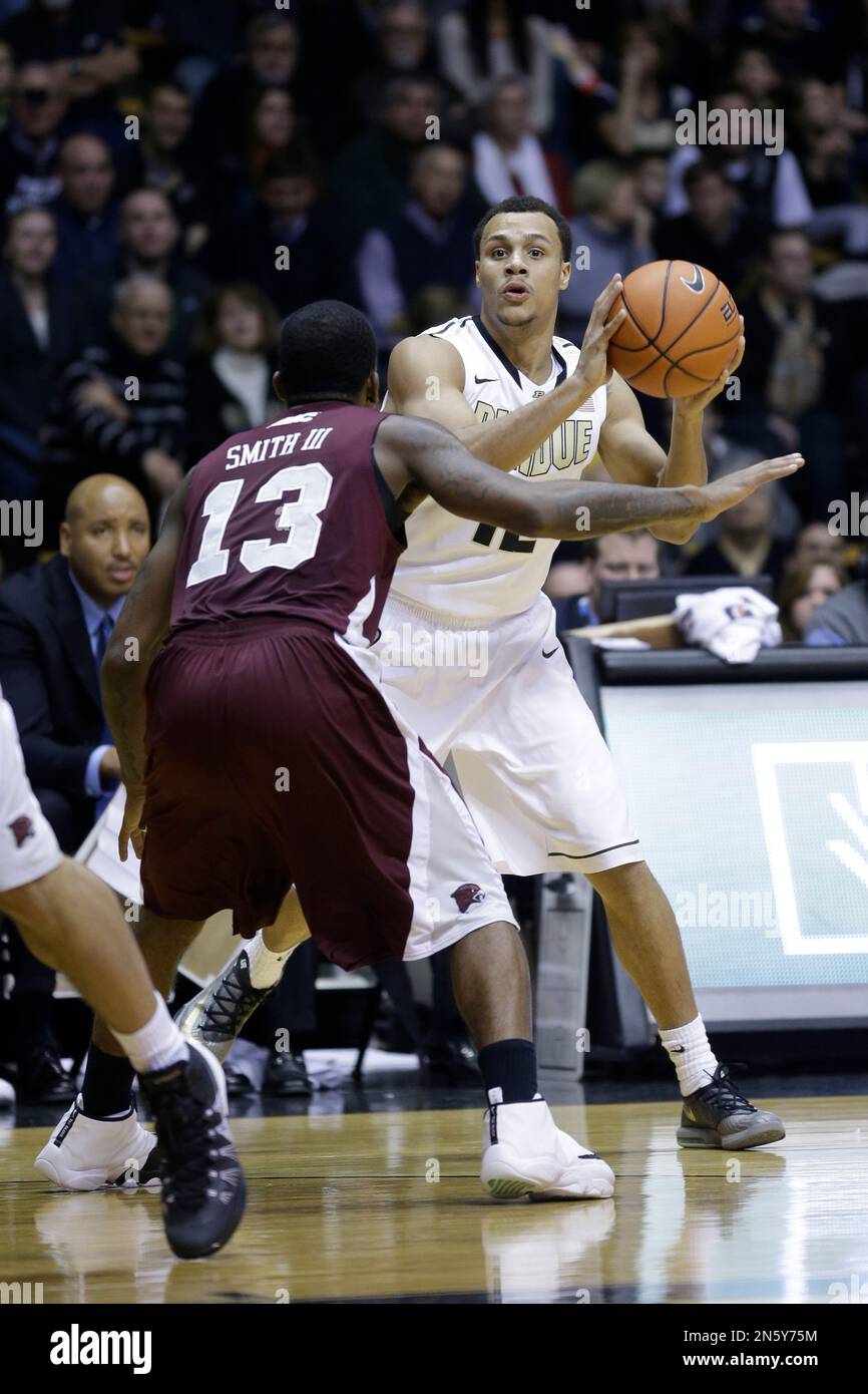 Purdue guard Bryson Scott, right, looks to shoot over Maryland-Eastern ...