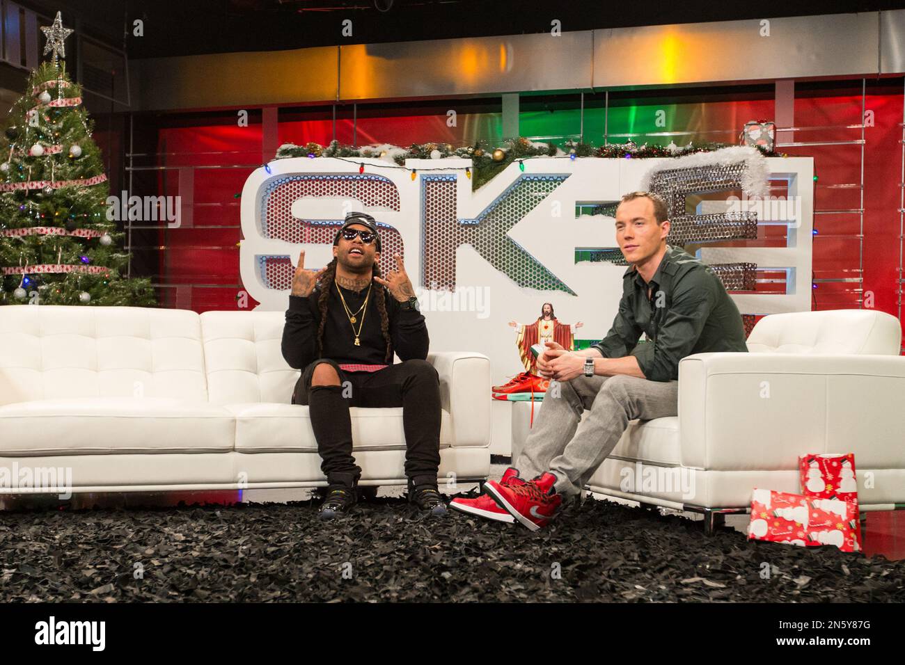 Ty Dolla Sign (L) and host DJ Skee on set during filming of SKEE Live ...