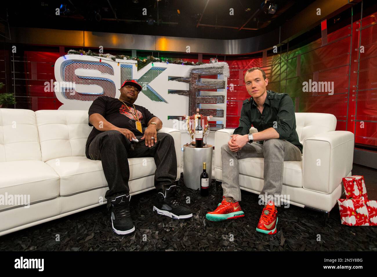 E-40 (L) and host DJ Skee on set during filming of SKEE Live on Tuesday ...