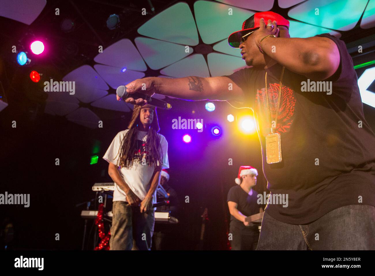 E-40 and Cousin Fik (L) perform on stage during filming of SKEE Live on ...
