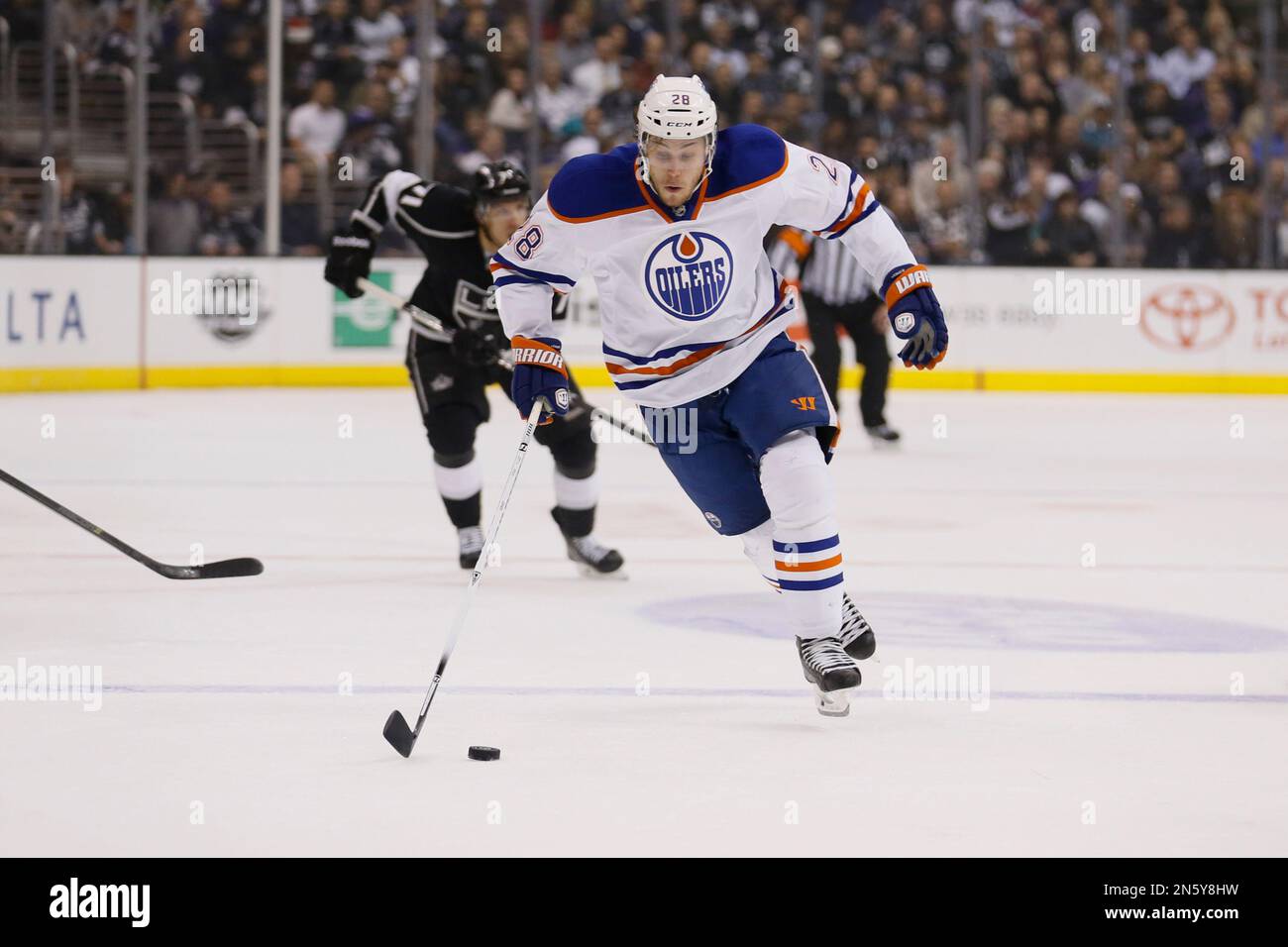 Edmonton Oilers' Ryan Jones skates with the puck against the Los ...