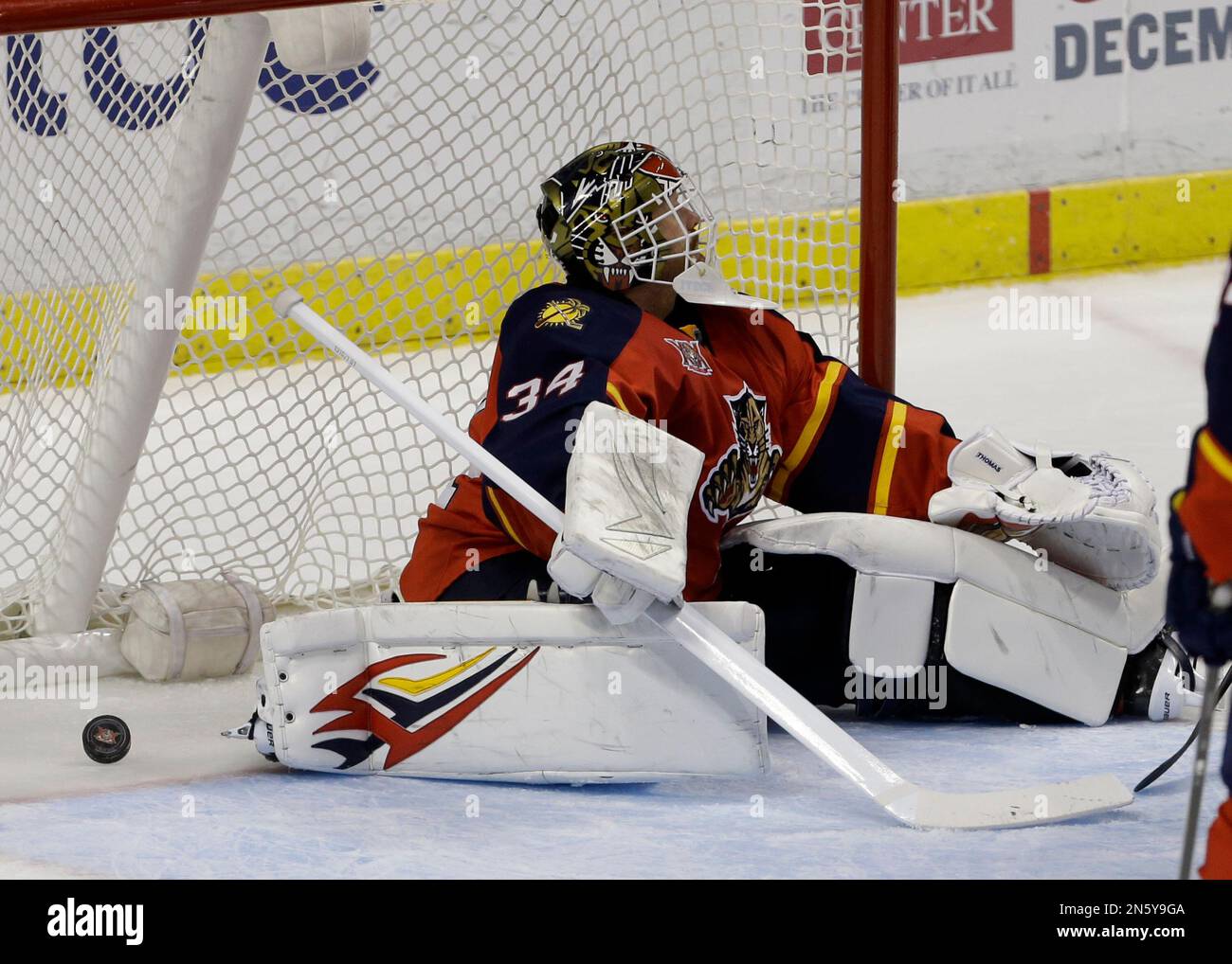 The puck gets past Florida Panthers goalie Tim Thomas (34) for a goal ...