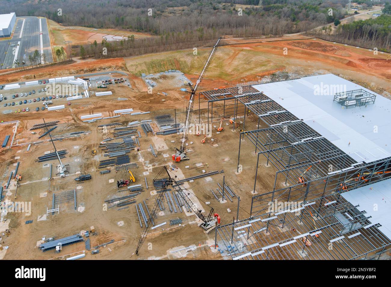 An extensive set of construction equipment is seen working on under ...