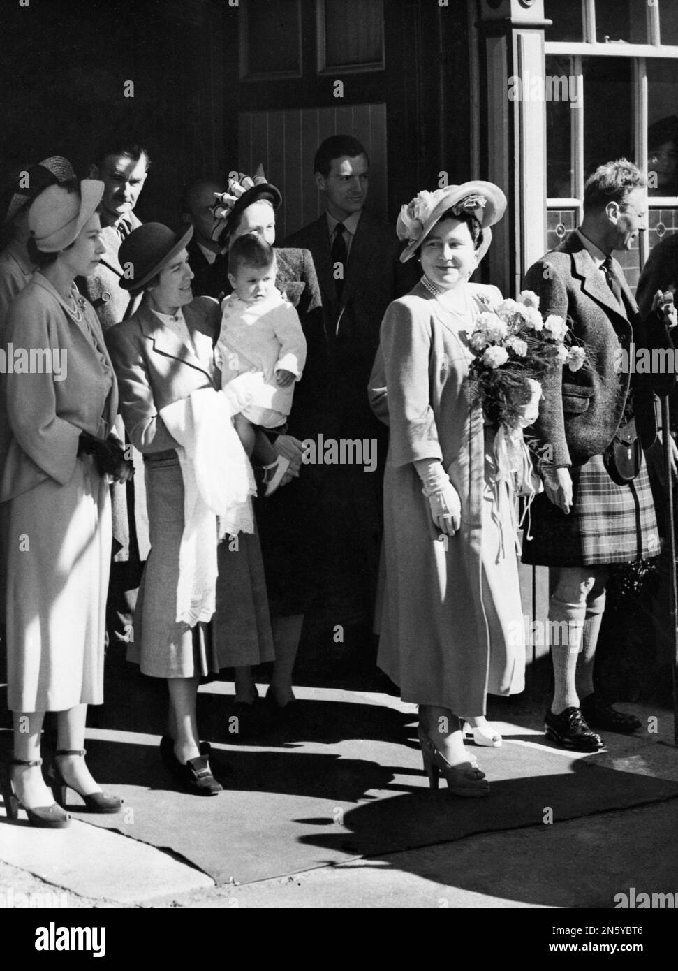 Britain's King George Vi, right, and Queen Elizabeth, accompanied by ...