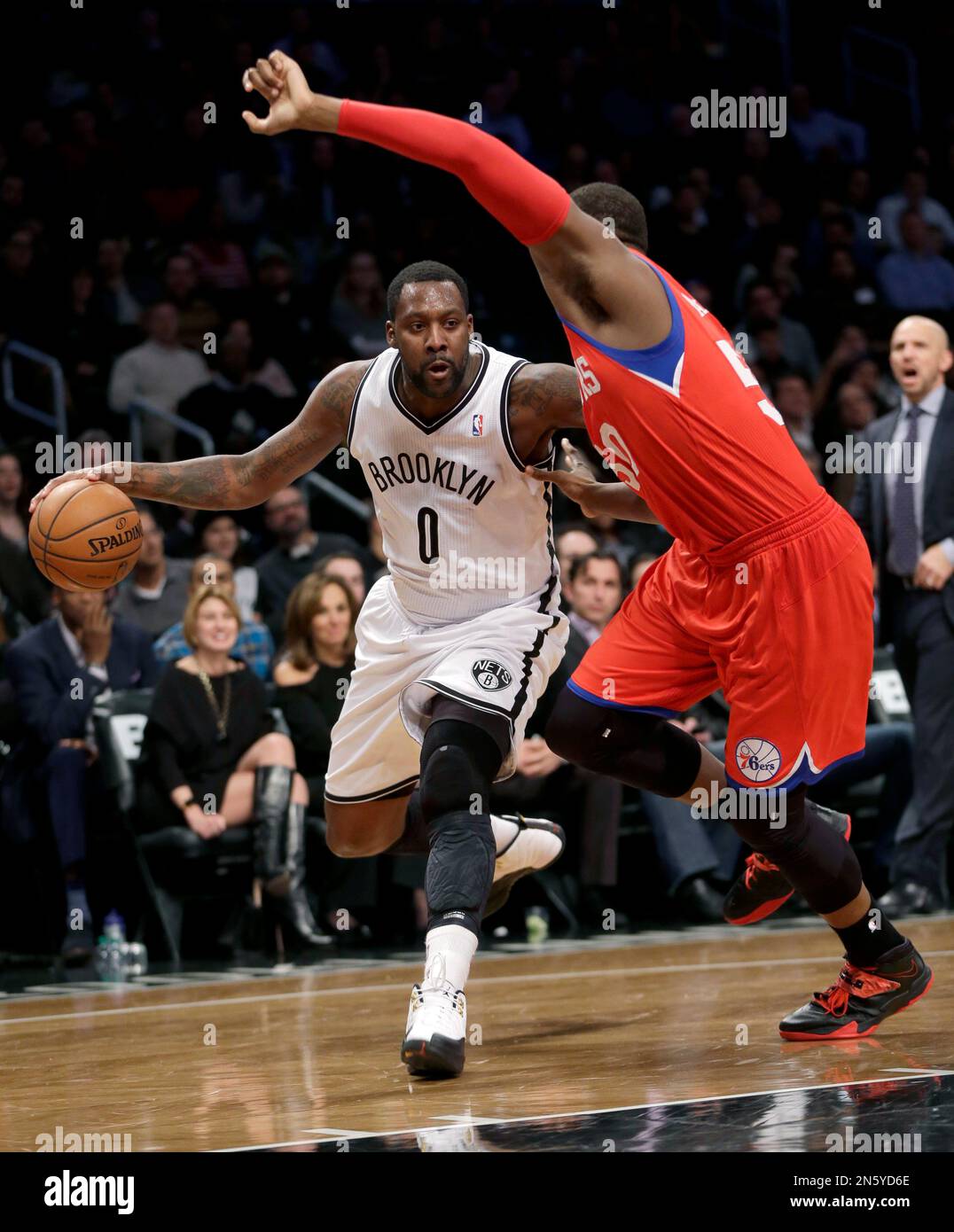 Brooklyn Nets' Andray Blatche, left, tries to move past Philadelphia ...