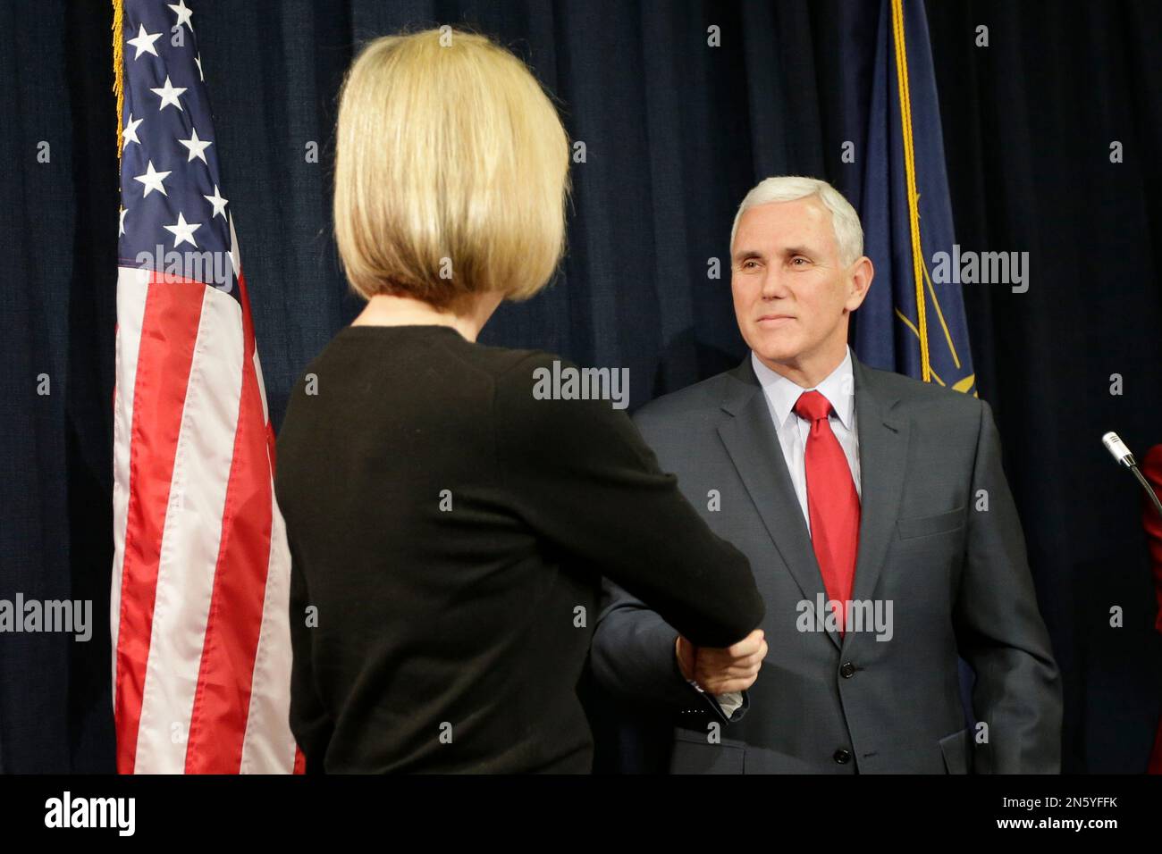 Indiana Gov. Mike Pence, right, congratulates Rep. Suzanne Crouch R ... Indiana Gov. Mike Pence, right, congratulates Rep. Suzanne Crouch R ...