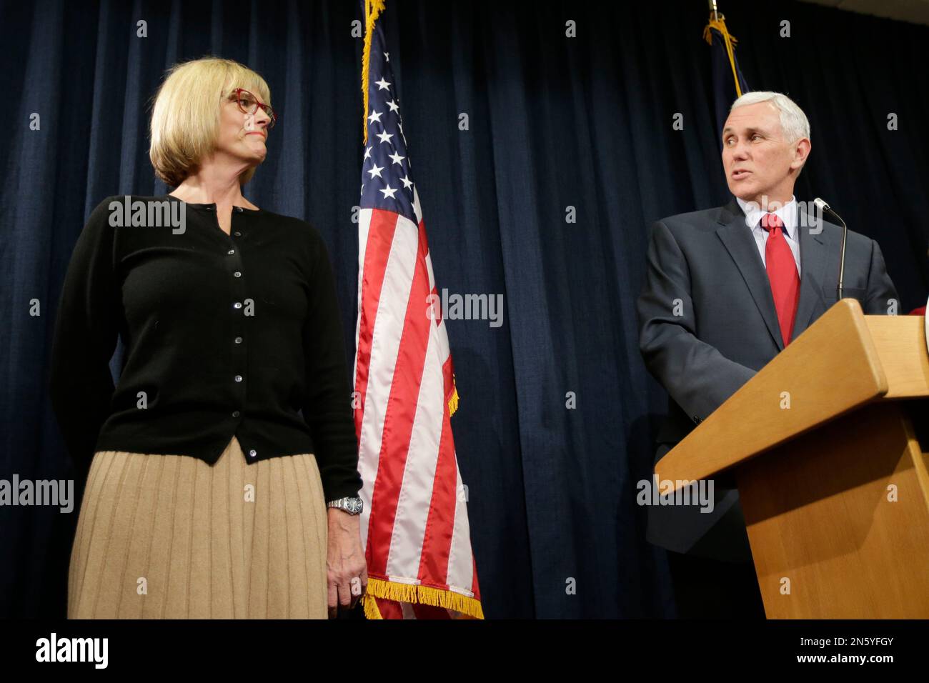 Indiana Gov. Mike Pence, left, announces Rep. Suzanne Crouch R ... Indiana Gov. Mike Pence, left, announces Rep. Suzanne Crouch R ...