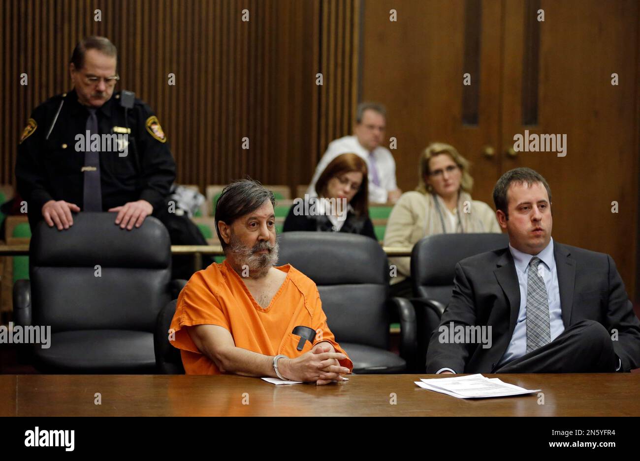 John Donald Cody, center, sits with attorney Joseph Patituce, right ...