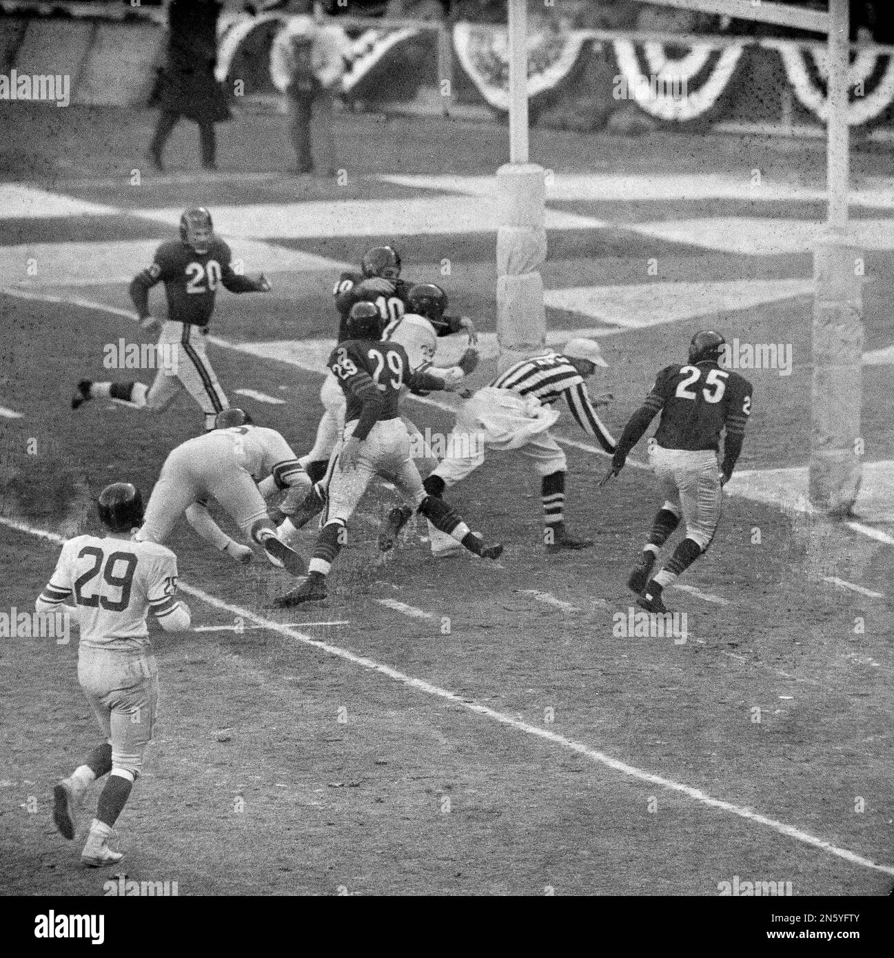 Giants' Mel Triplett (33) picks up a block and then charges past ...