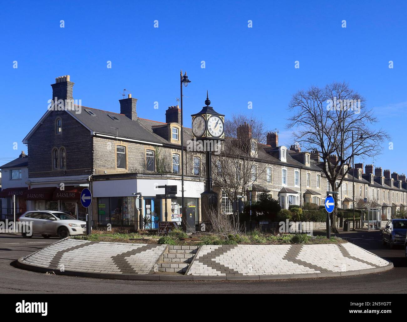 Traffic island with clock, town centre, Penarth, Vale of Glamorgan ...