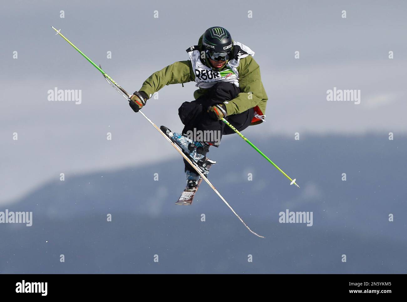 Noah Wallace flies off a jump during the slopestyle freestyle skiing ...