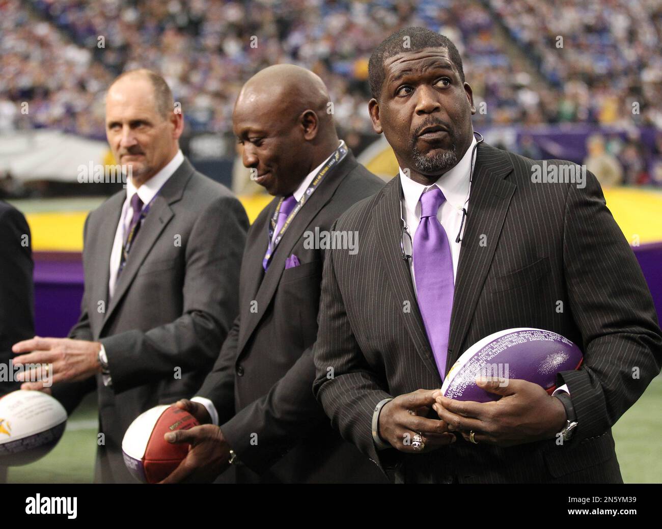 Former Minnesota Vikings players Randle McDaniel (right to left), John ...