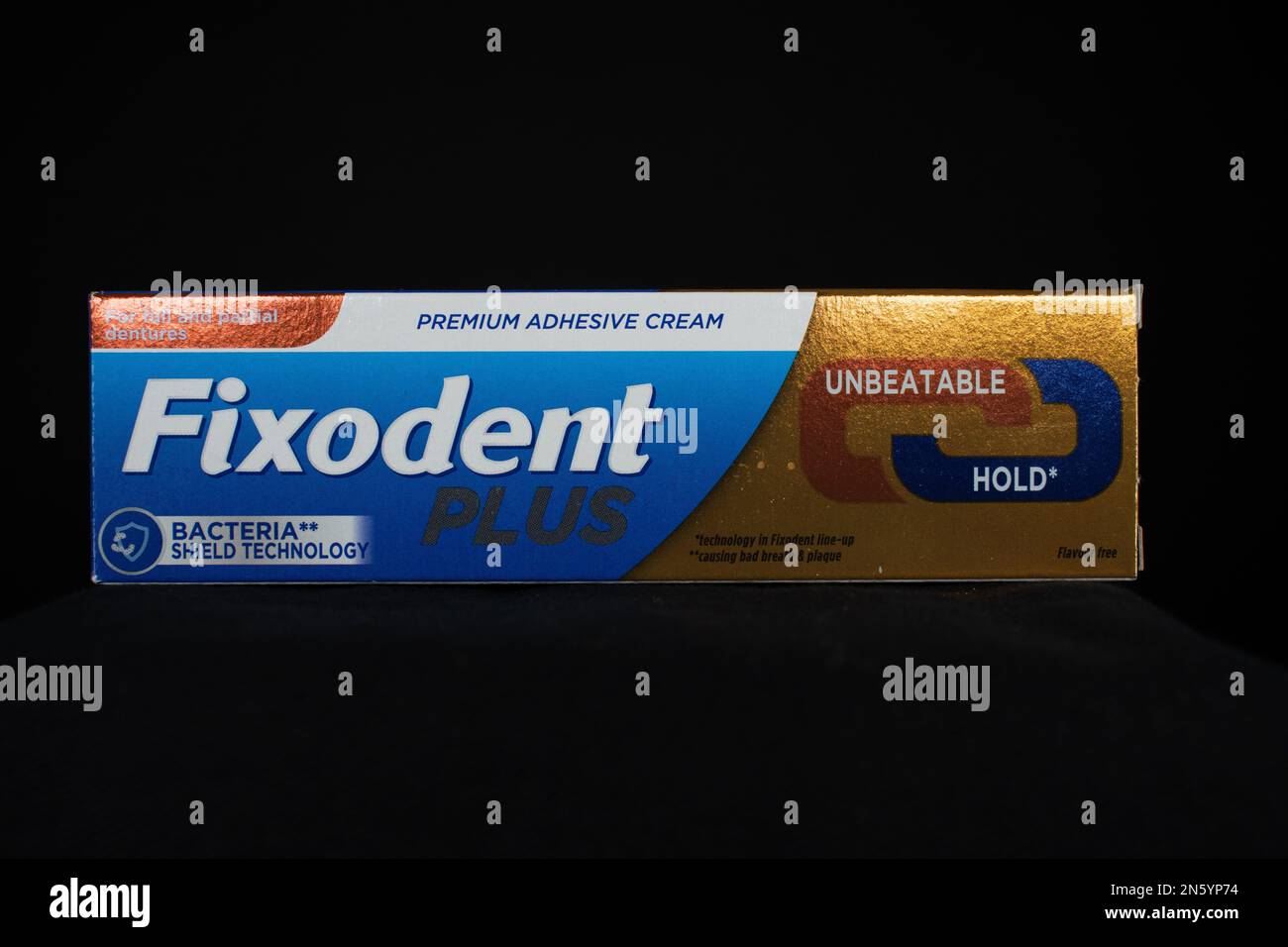 EXETER, DEVON, UK - JANUARY 17, 2023 Fixodent Plus denture adhesive box ...