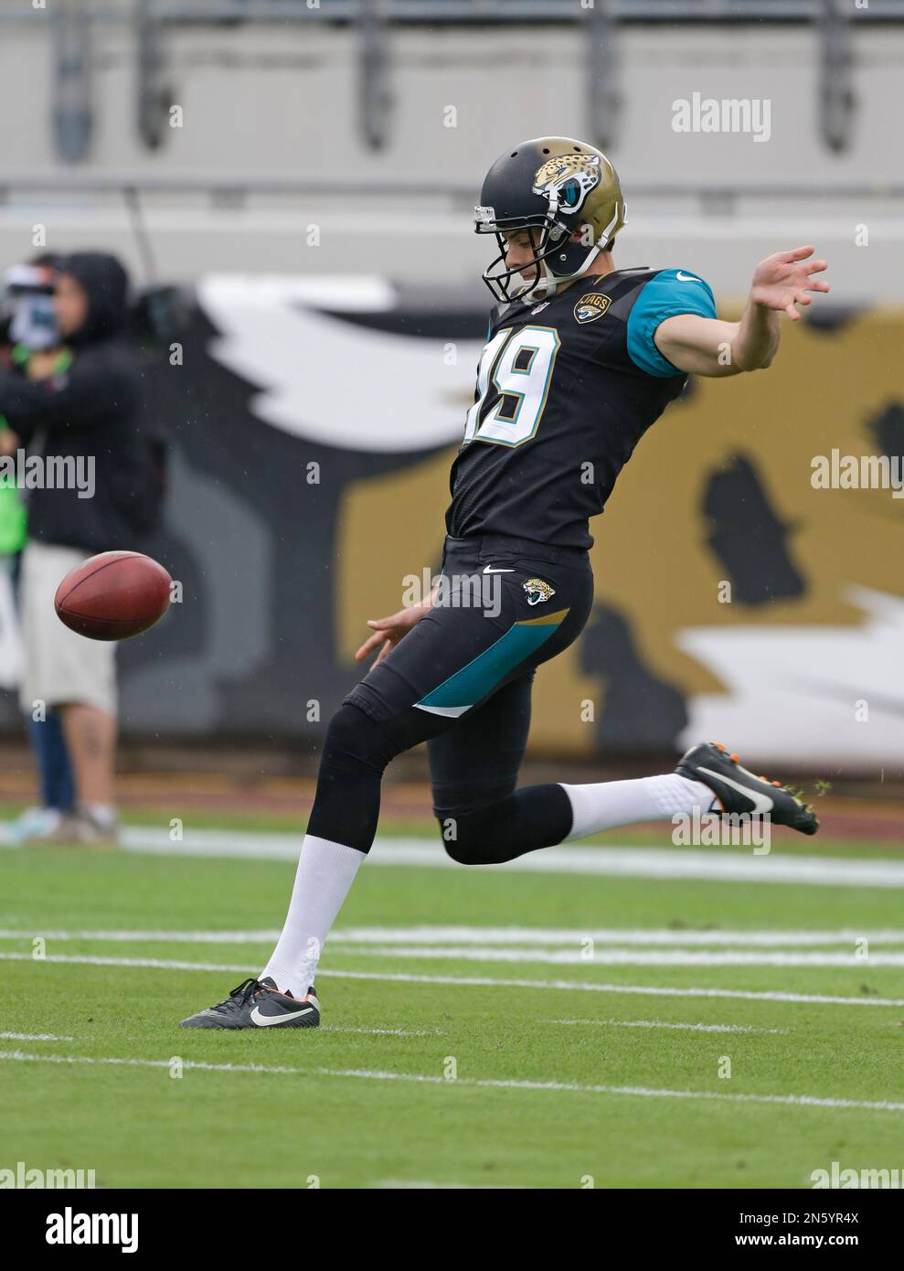 Jacksonville Jaguars punter Bryan Anger kicks as he warms up prior to ...