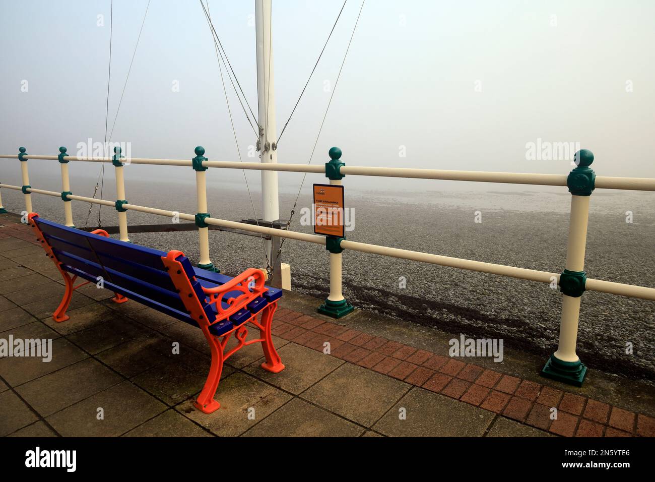 Orange and blue Friendship bench with sign at Penarth promenade, Vale ...